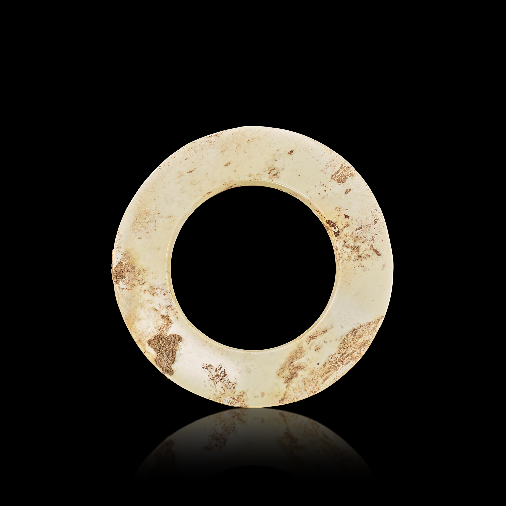 An archaic calcified jade ring, yuan, Neolithic period, Liangzhu ...