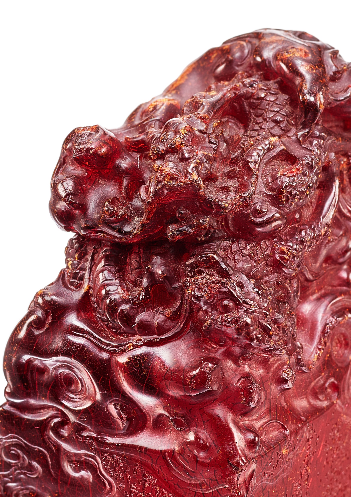 An important and exceptionally rare imperial carved amber 'five dragons ...