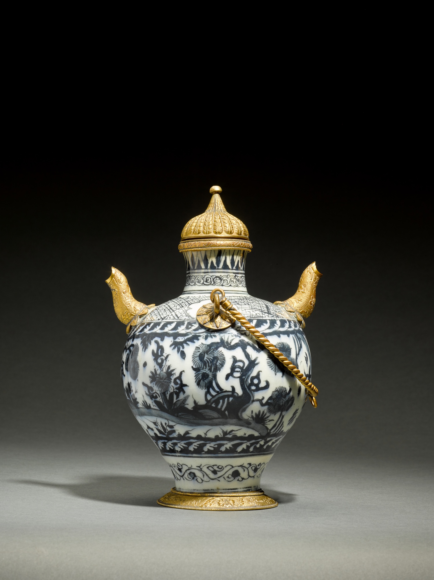A Safavid blue and white pottery vase, 17th century, with Ottoman ...