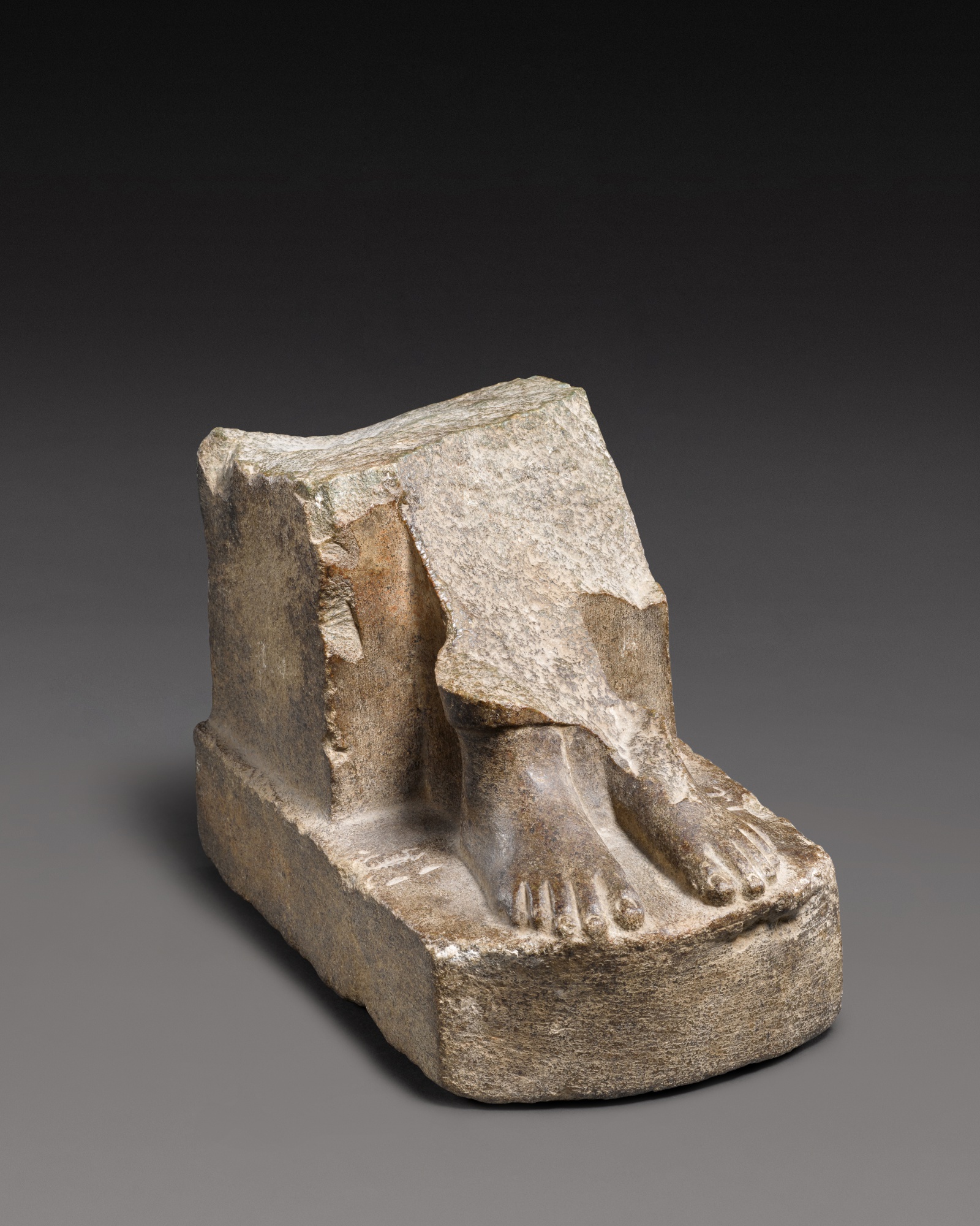 An Egyptian Basalt Statue Fragment, Late Period, 712-30 B.C., or ...