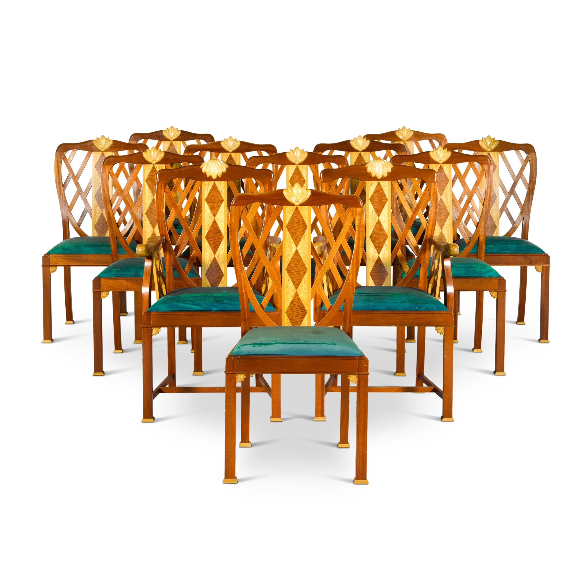 A set of twelve mahogany, maple and parquetry lattice-back dining ...