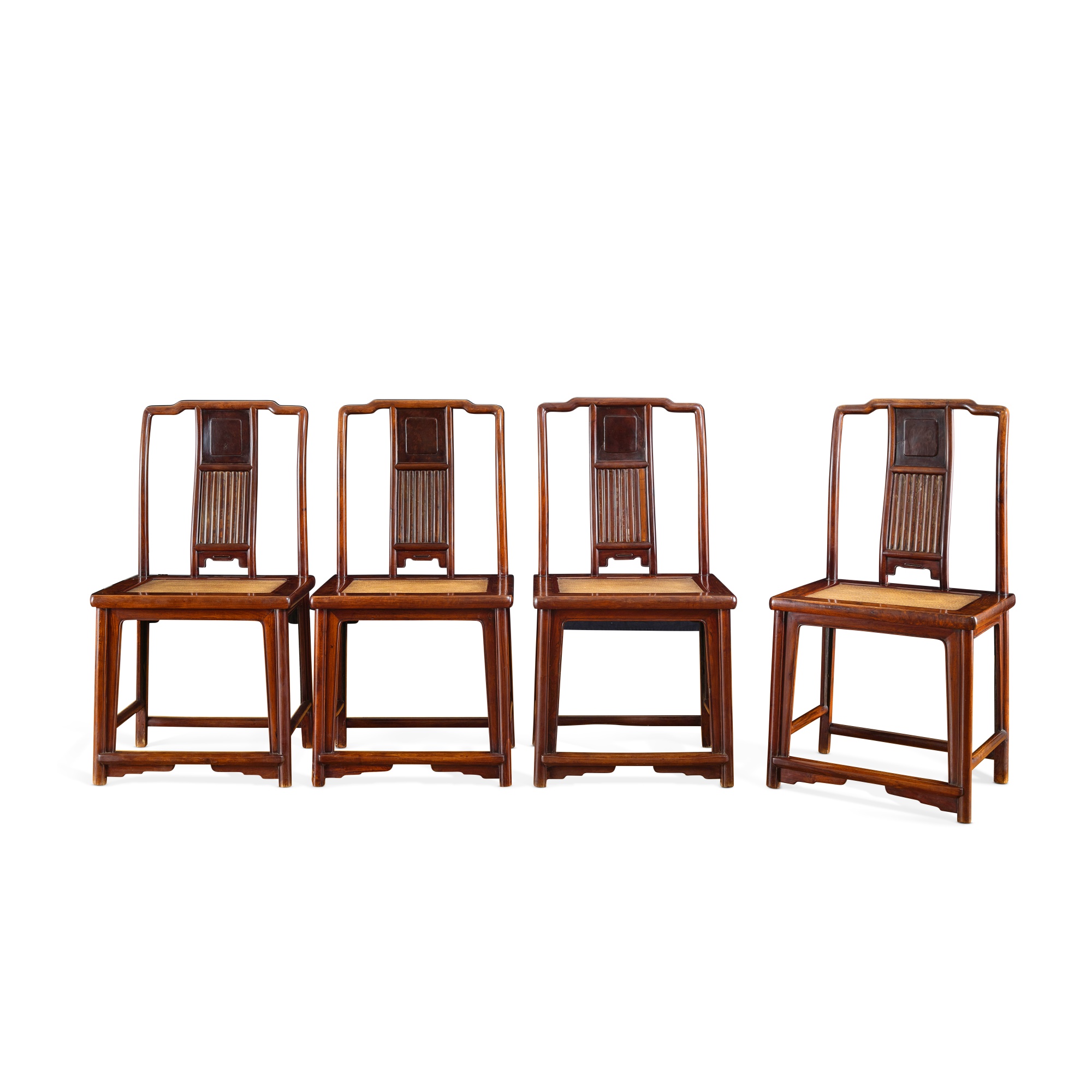 A rare set of four huanghuali and burlwood side chairs, Qing dynasty ...