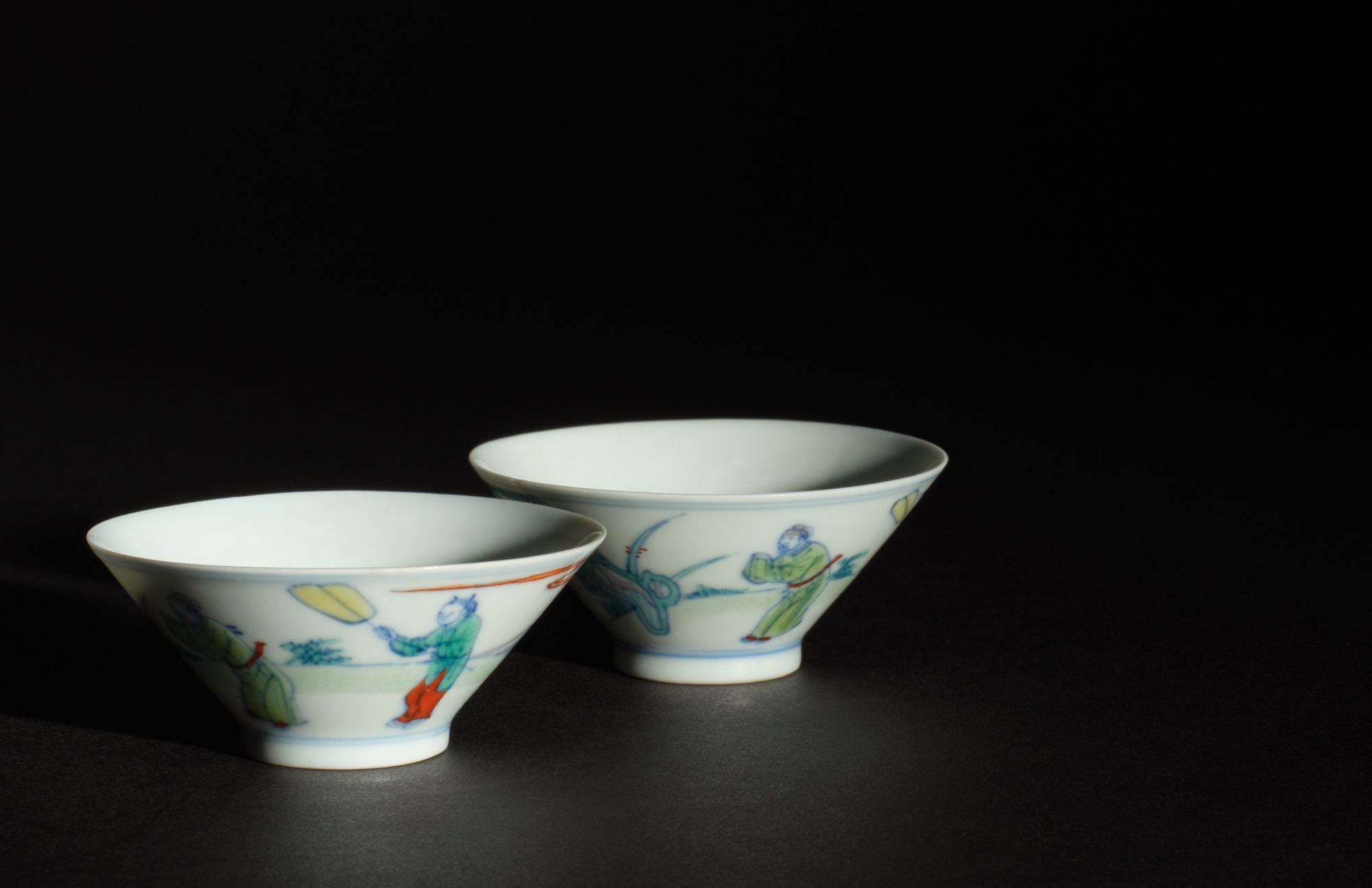 A pair of rare anhua-decorated doucai conical bowls, Qing dynasty ...