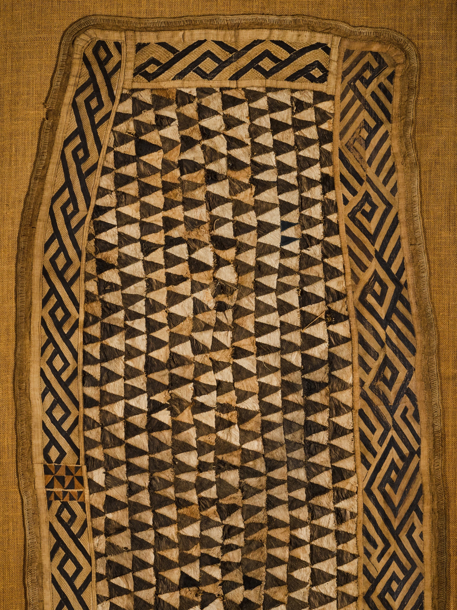 A Kuba woven raffia and embroidered textile, The Democratic Republic of ...