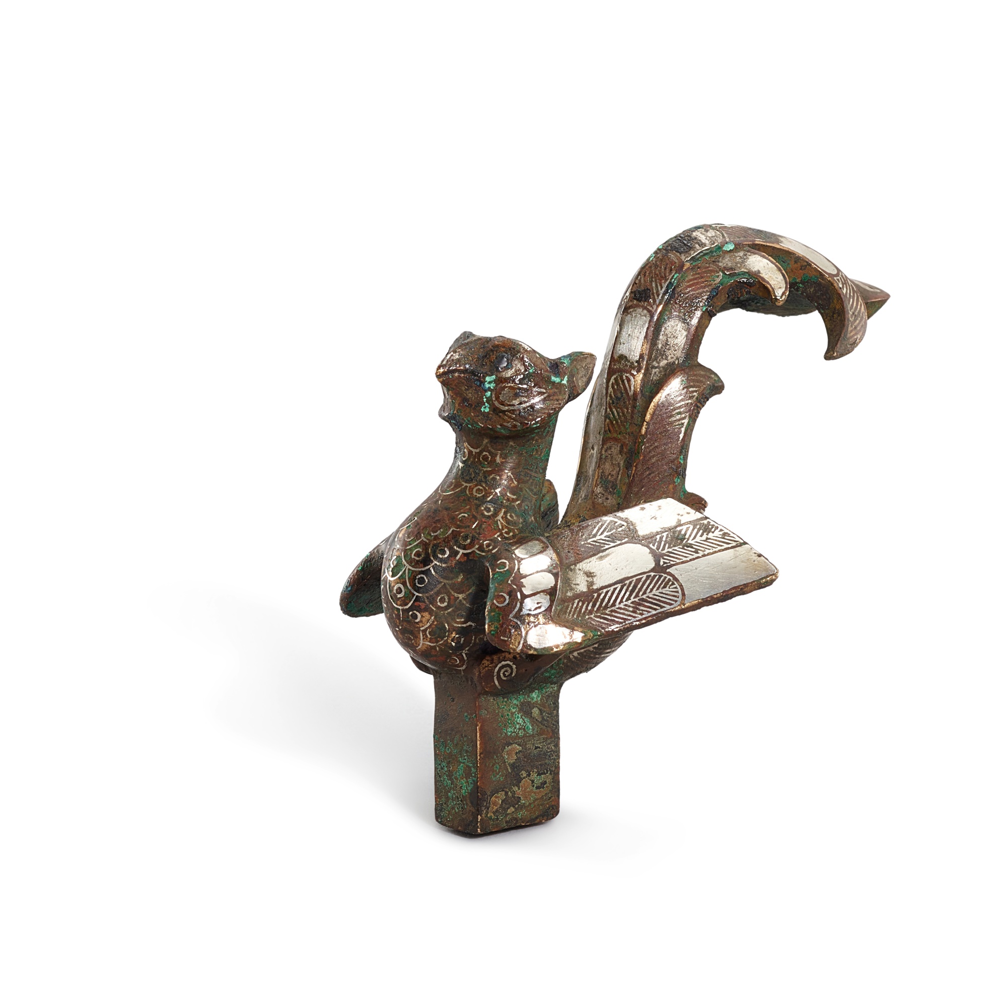 A silver-inlaid bronze 'bird' staff finial, Eastern Zhou dynasty 東周 ...