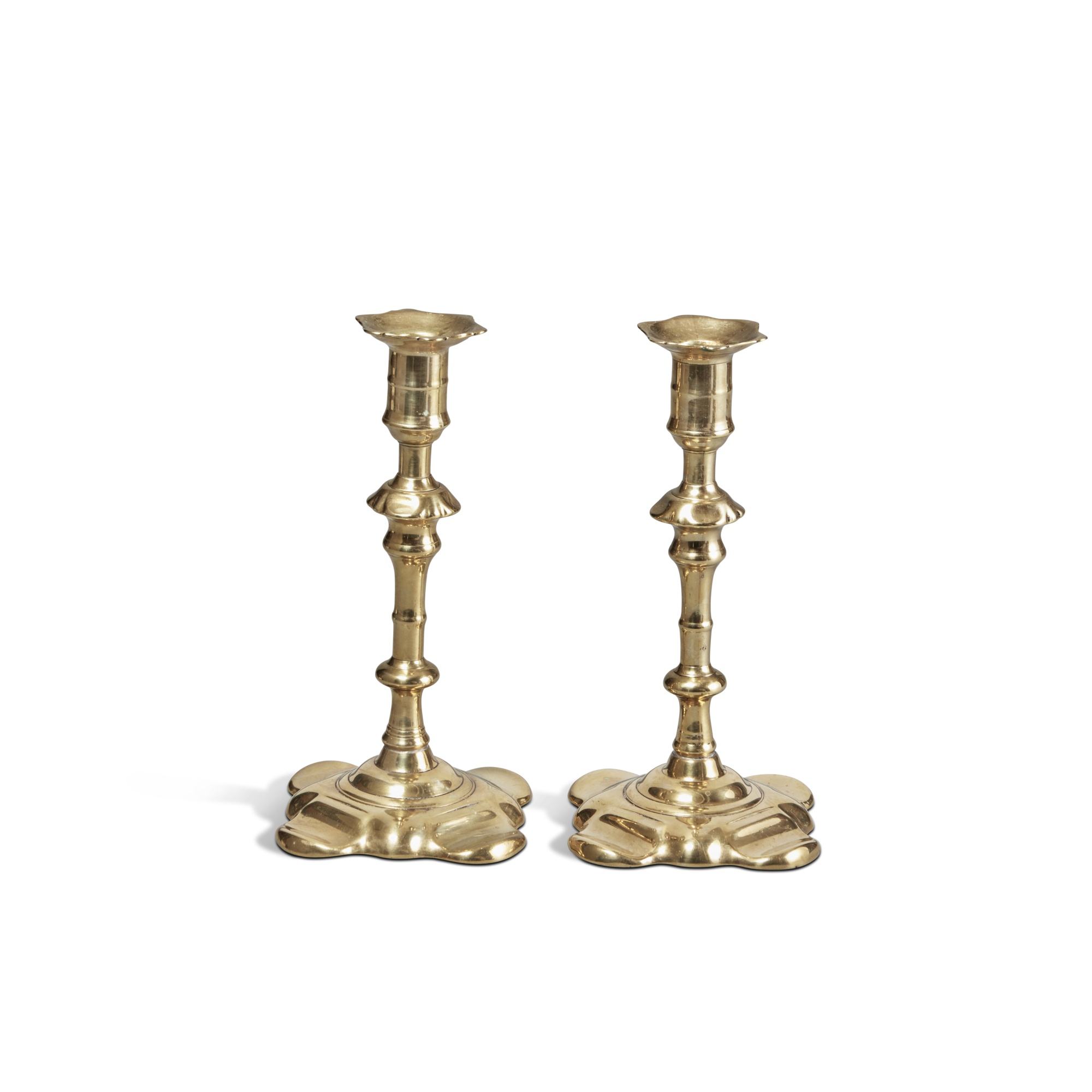 A Pair of English Cast-Brass Petal-Base Candlesticks, probably by ...