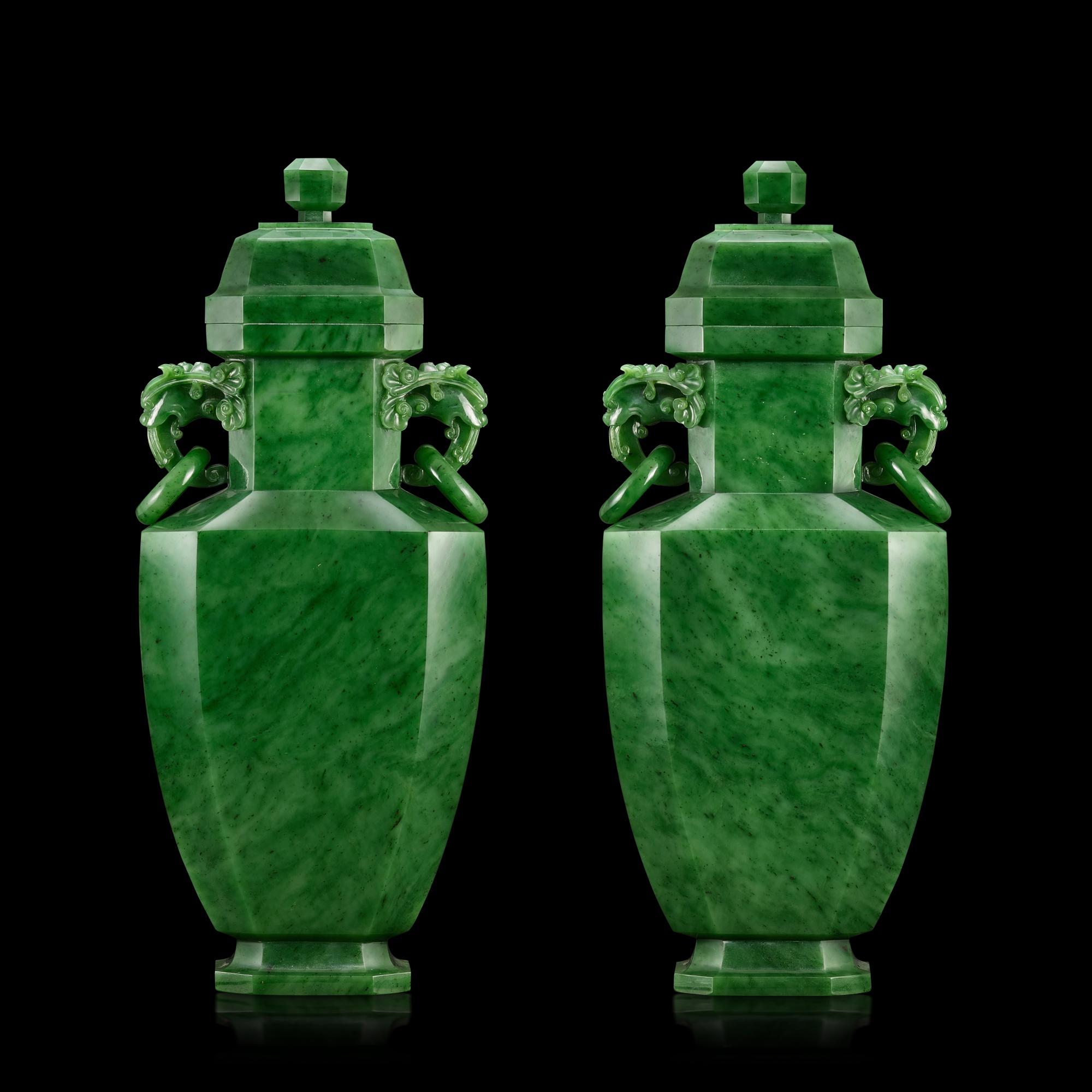 A pair of large spinach-green jade vases and covers, Qing dynasty, 18th ...
