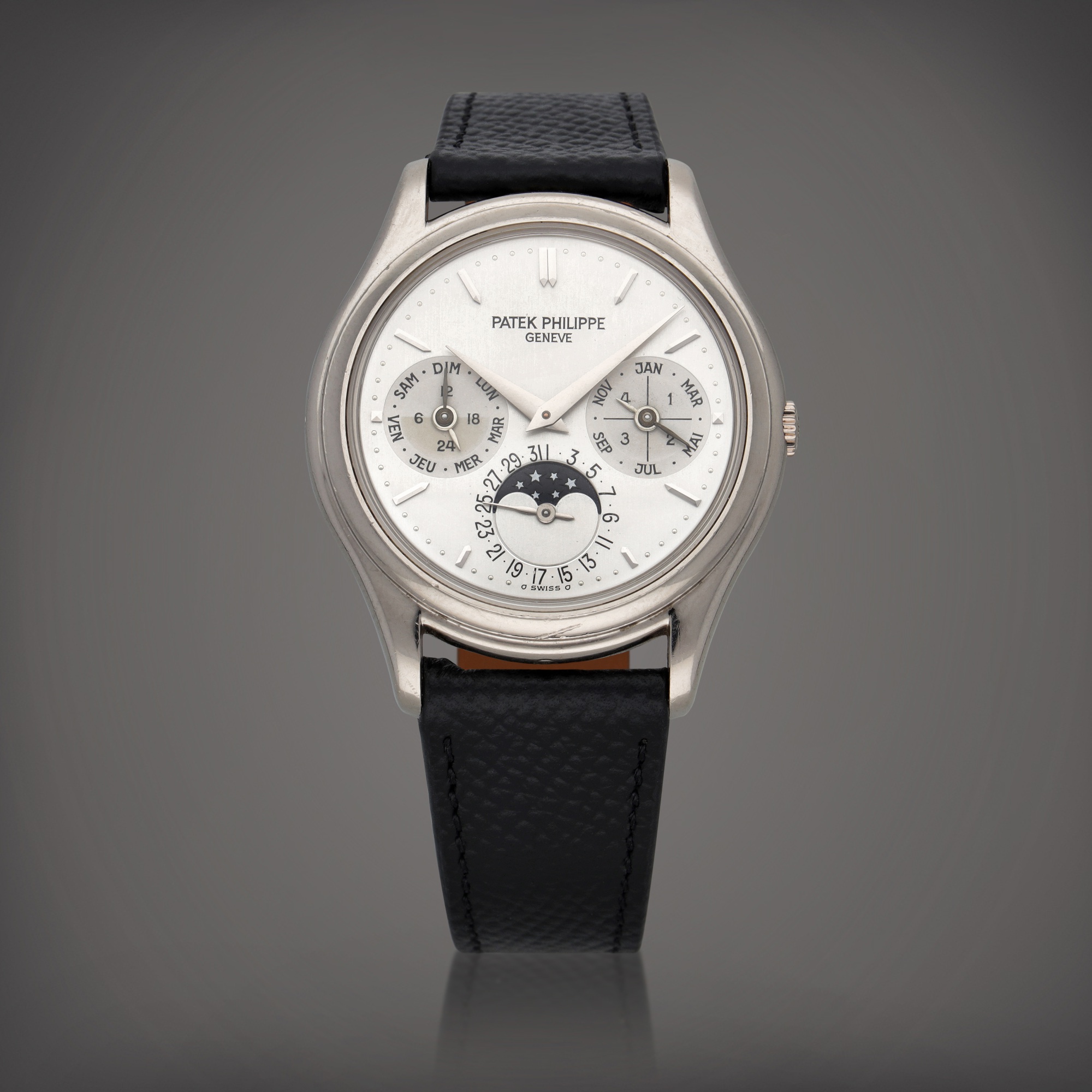 Reference 3940G-017 A white gold perpetual calendar wristwatch with day ...