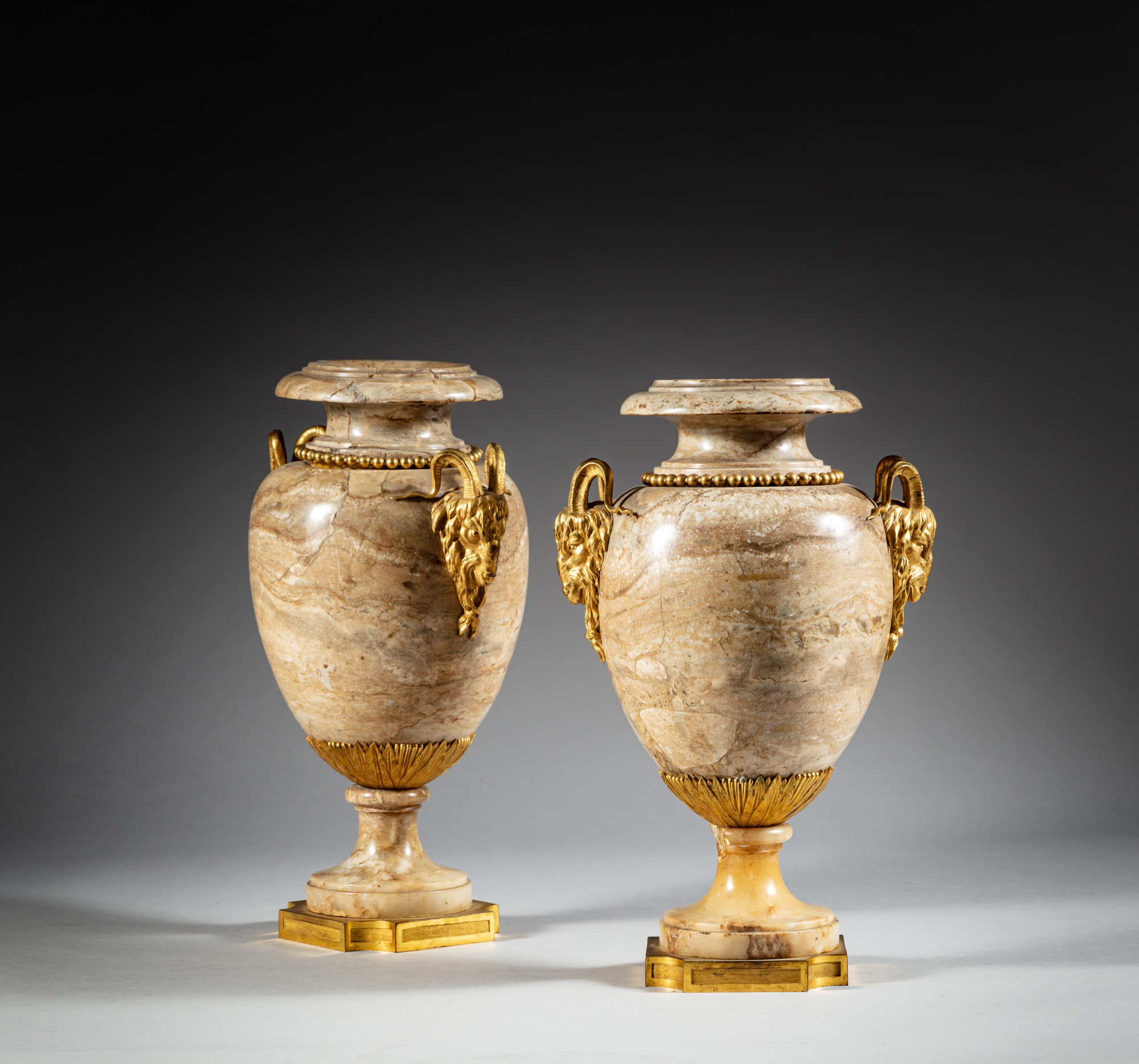 A pair Louis XVI gilt-bronze mounted hardstone and alabaster vases ...