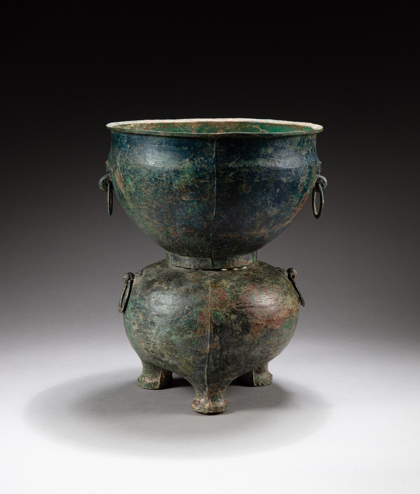A bronze ritual tripod steaming vessel, yan Han dynasty | 漢 青銅獸首啣環甗 ...