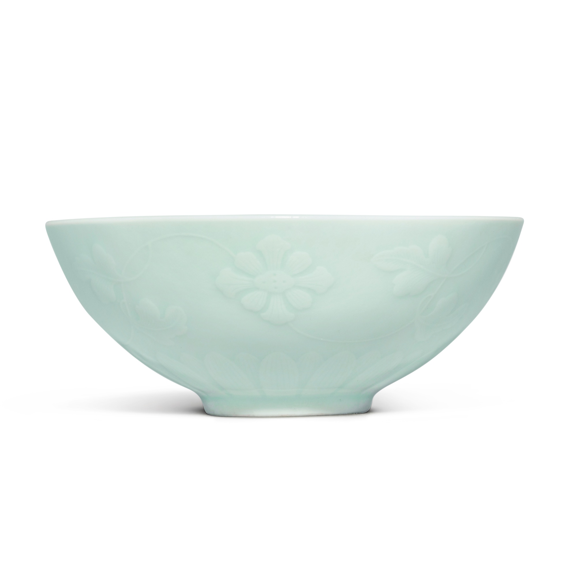 A fine molded celadon-glazed 'floral' bowl, Mark and period of ...