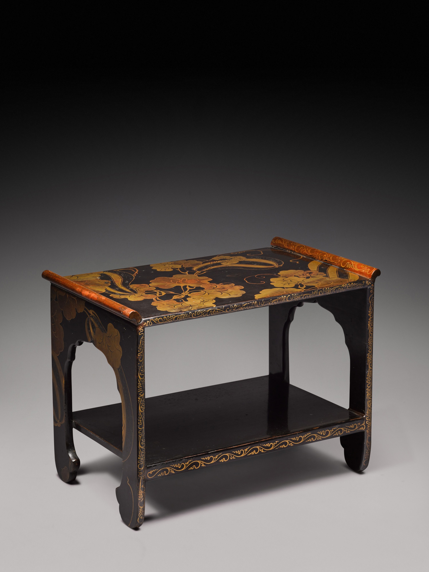 A Japanese lacquer two-tiered table (nikaidana), Momoyama-Edo period ...
