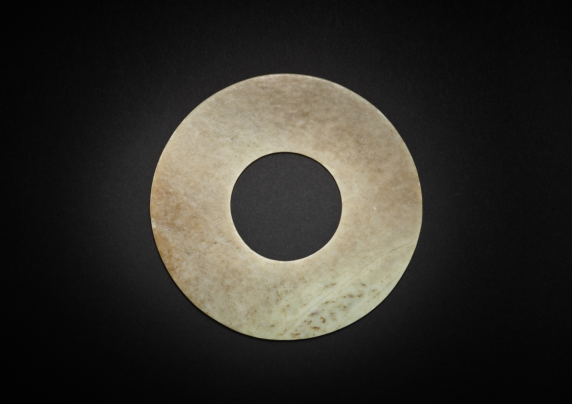 A greyish-celadon jade disc, huan, Neolithic period | 新石器時代 灰青玉環 ...