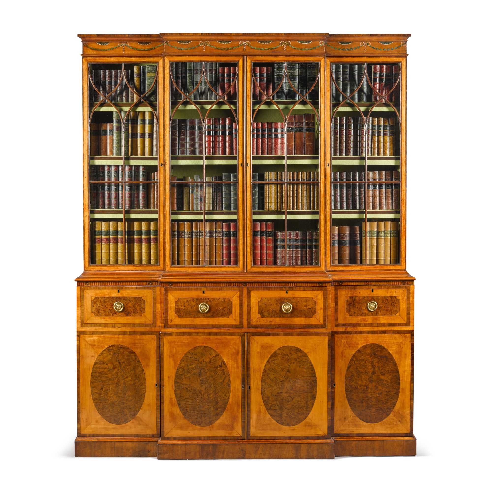 A George III mahogany, satinwood and burr walnut breakfront bookcase ...