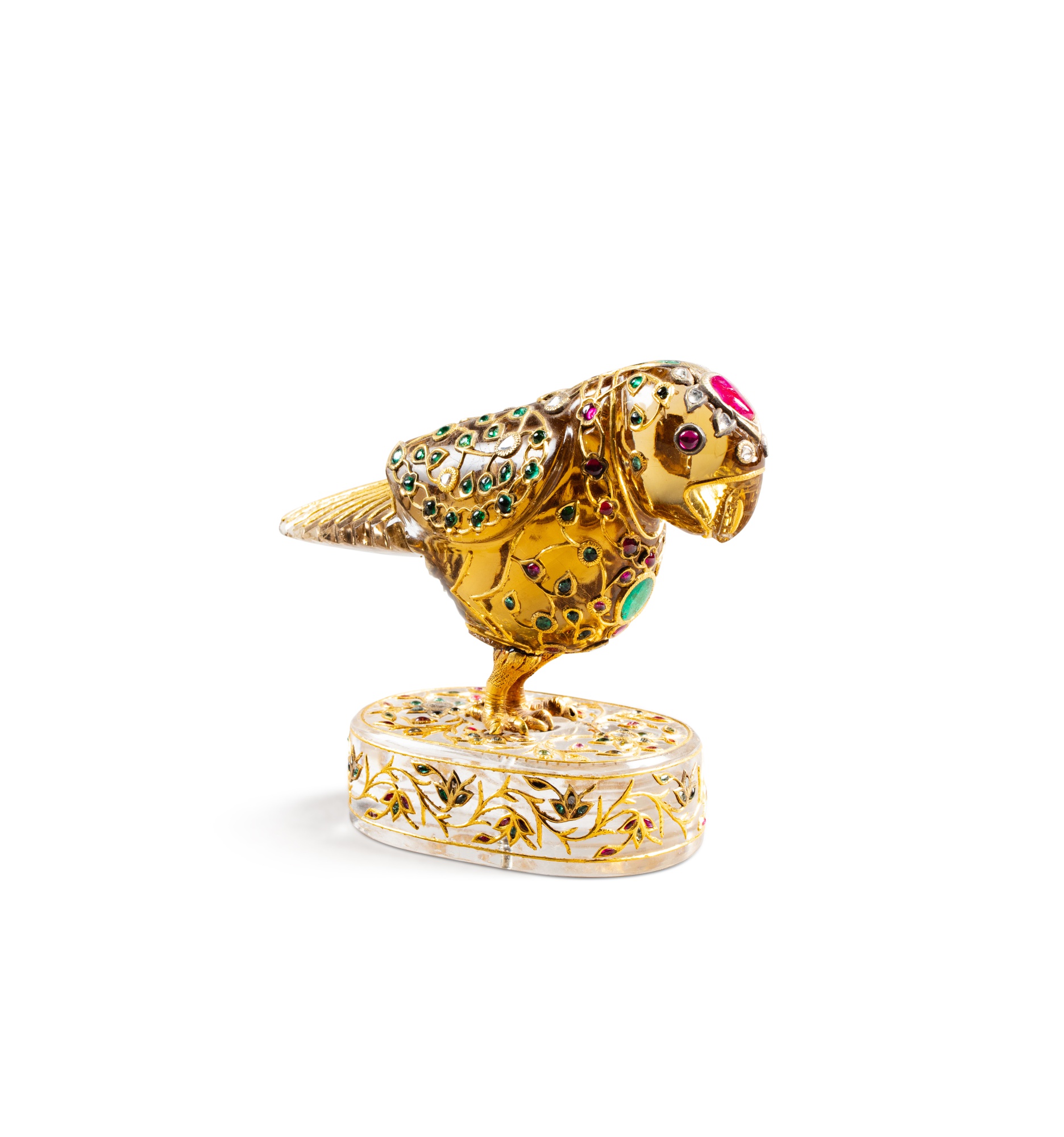 A Mughal ambered rock crystal, gold and precious stones parrot, 19th ...