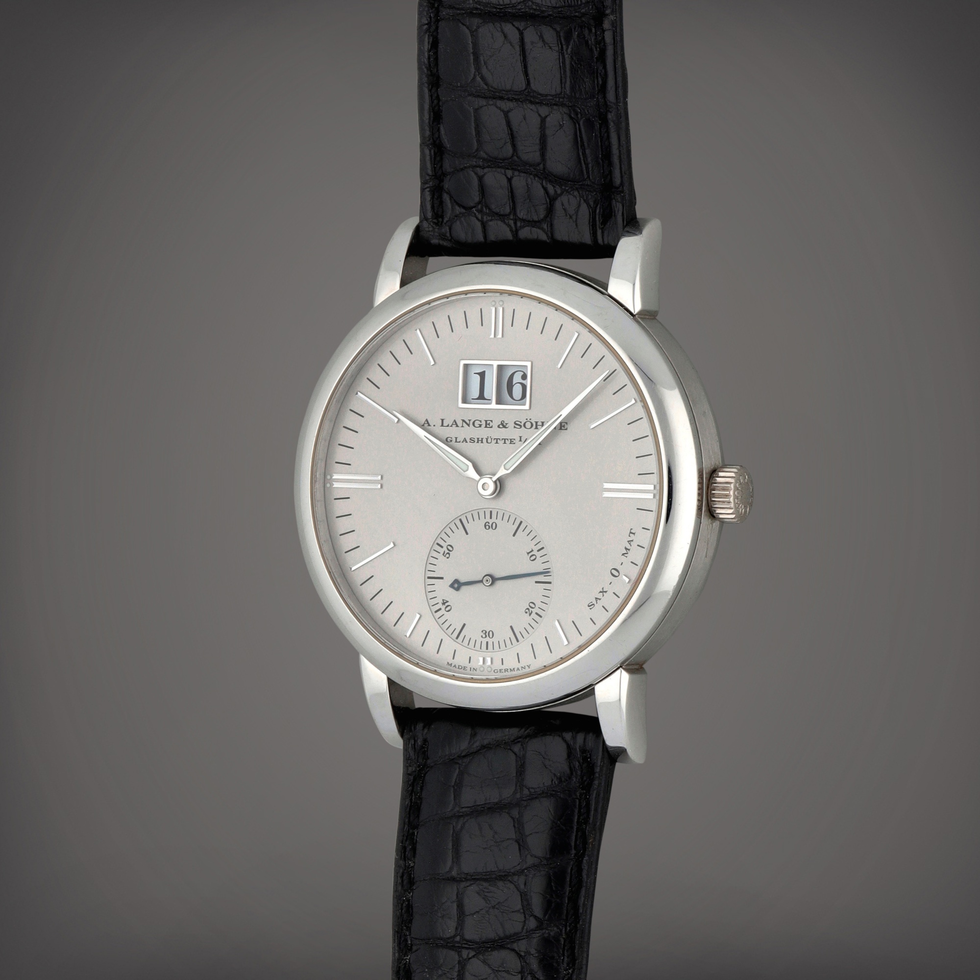 Sax-O-Mat, Reference 308.025 | A platinum wristwatch with digital date ...