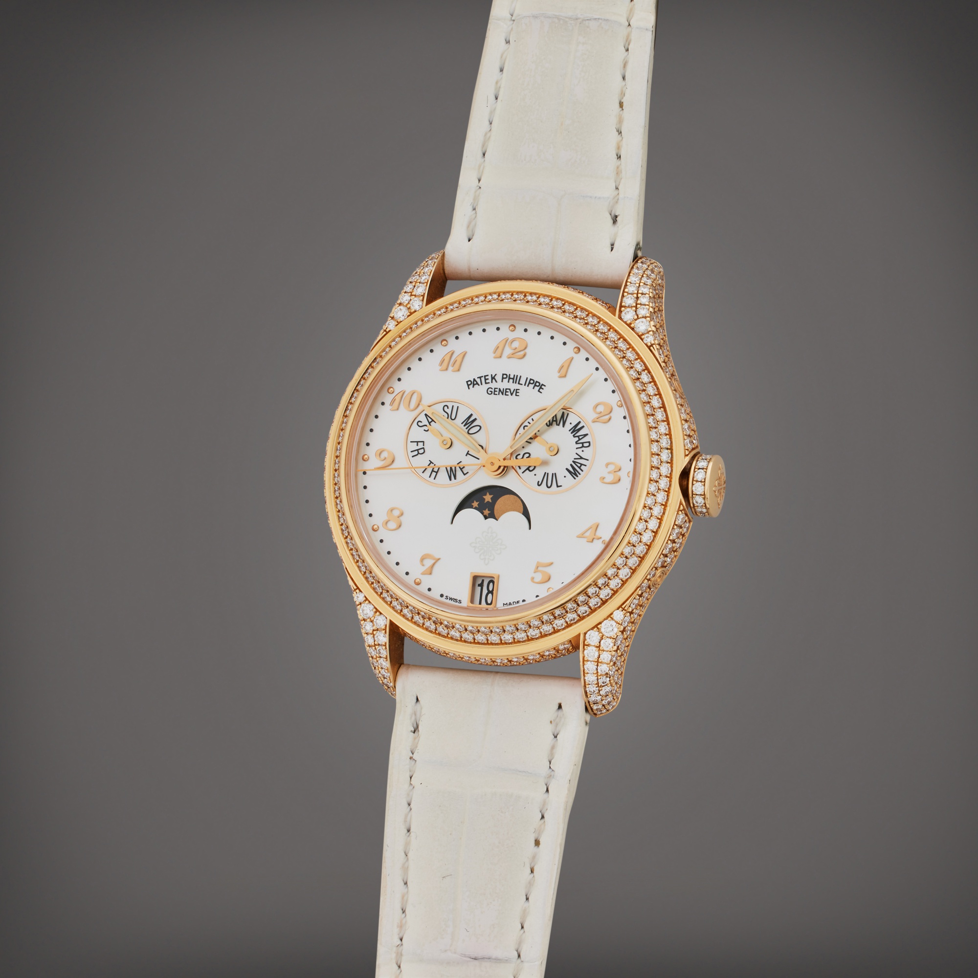 Reference 4937 | A pink gold and diamond-set annual calendar wristwatch ...