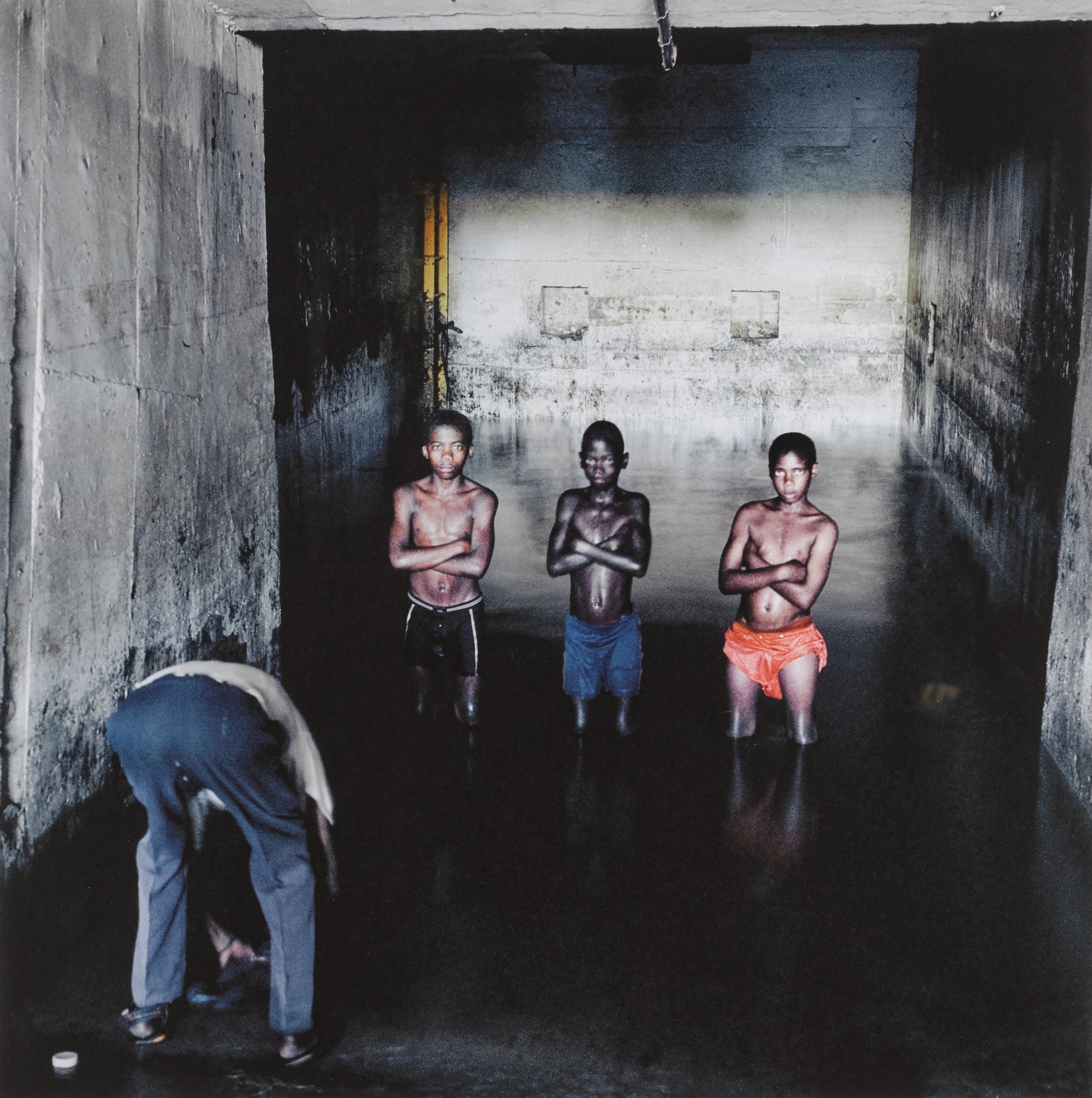 While Fernando Augusto Luta washed his clothes, Augusto Mokinda (13 ...