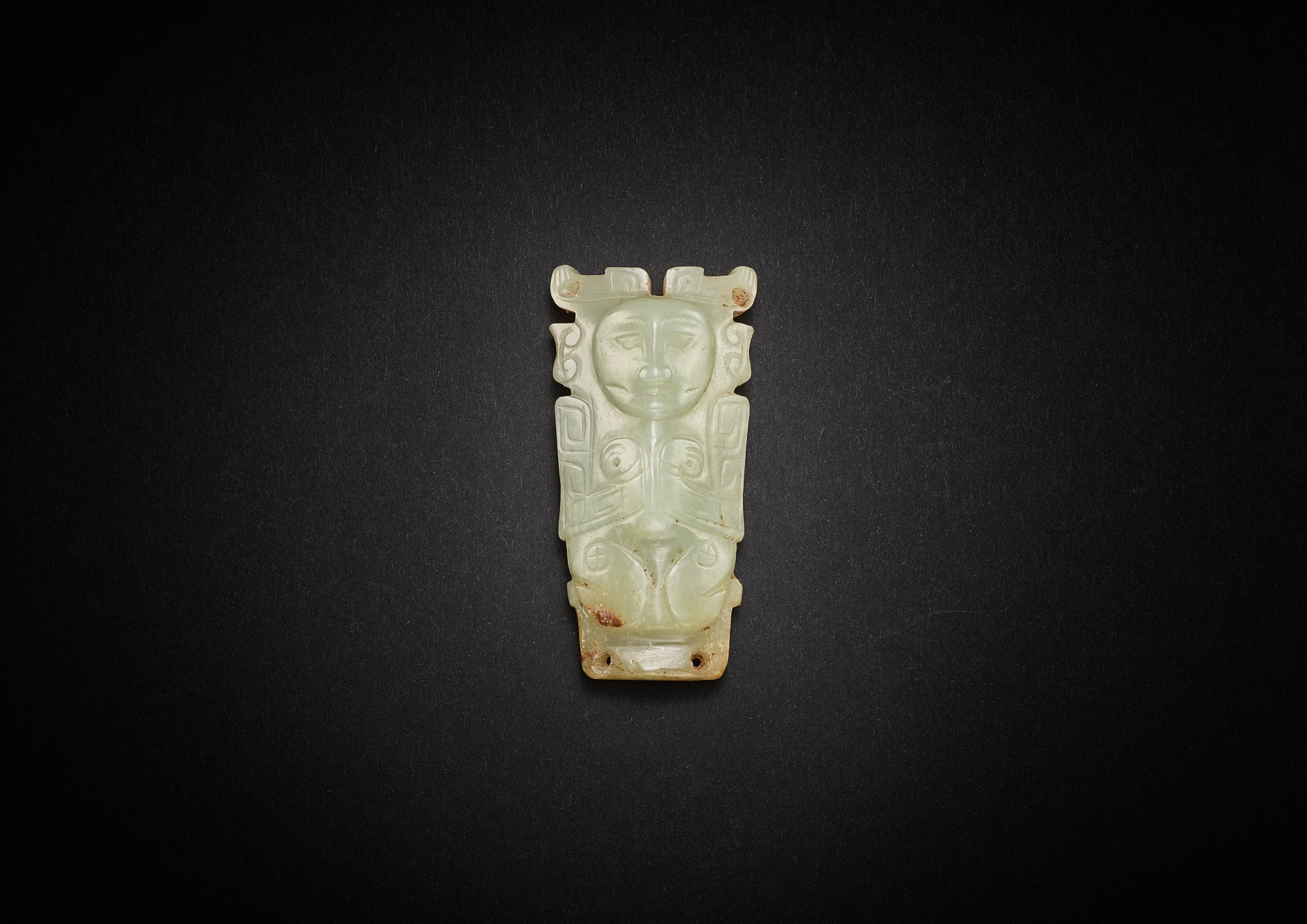 An extremely rare pale celadon jade 'kneeling human' ornament, Mid ...
