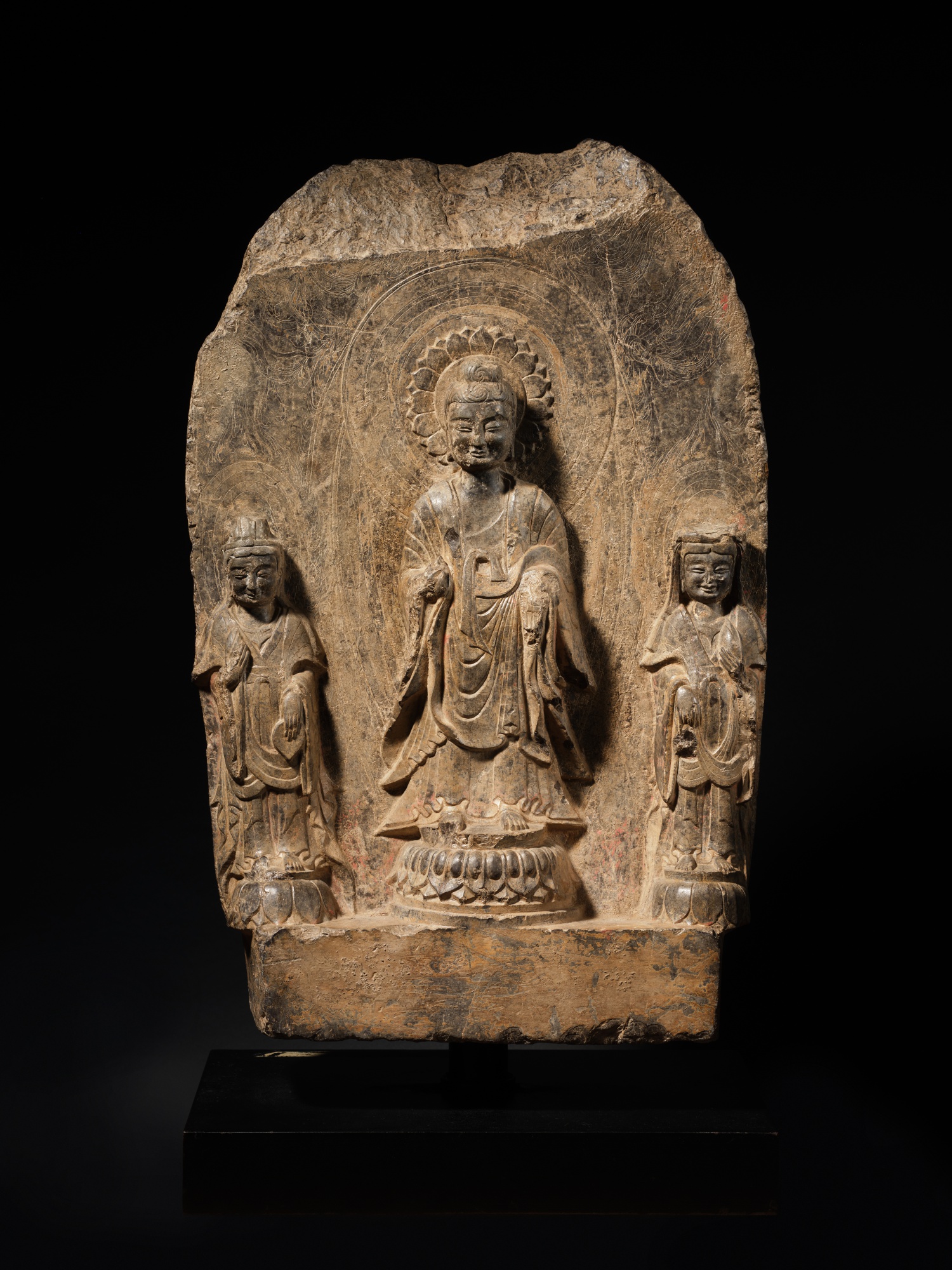 A grey limestone stele of Buddha and two Bodhisattvas, Northern Wei ...