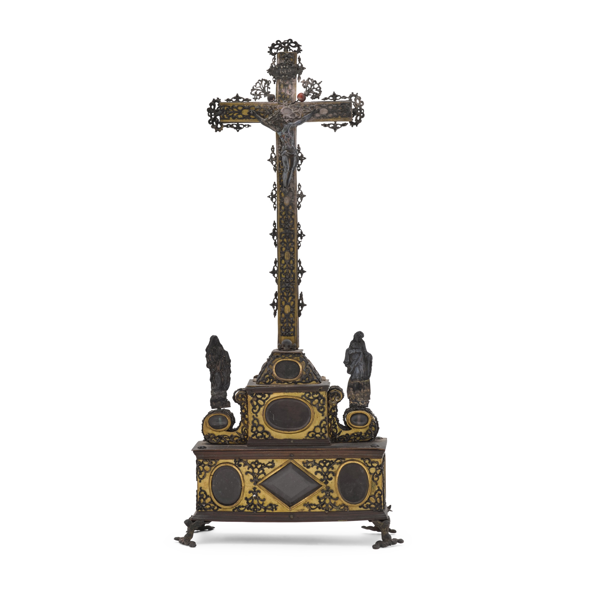 A Continental gilt-brass and pierced metal reliquary in the form of a ...