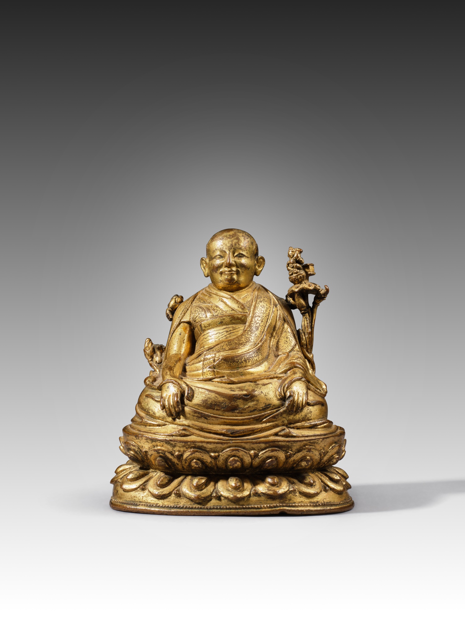 An inscribed gilt-copper alloy figure of Chokyi Gyelpo, Tibet, 16th ...