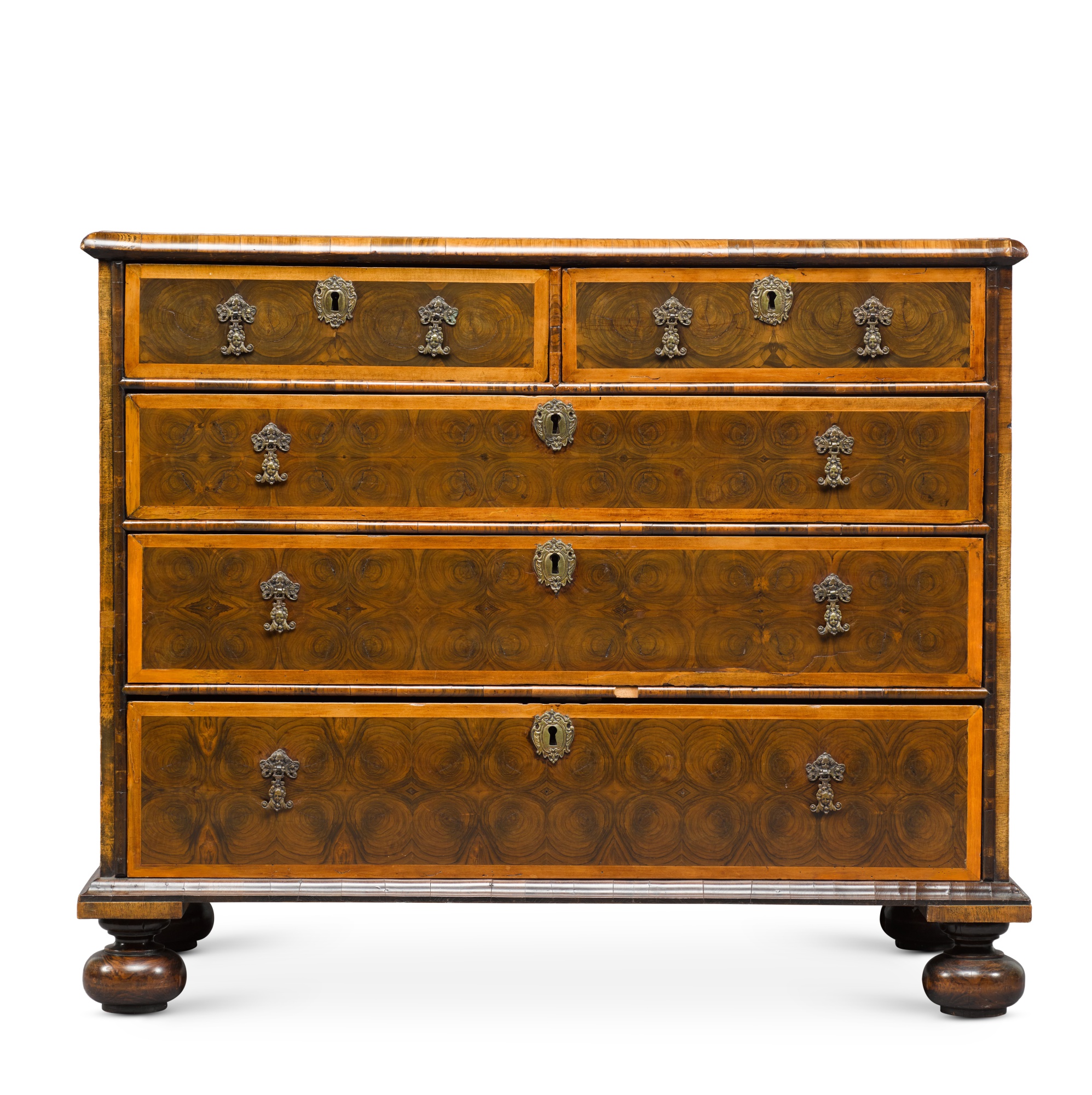 A William and Mary olivewood oyster-veneered chest of drawers, early ...