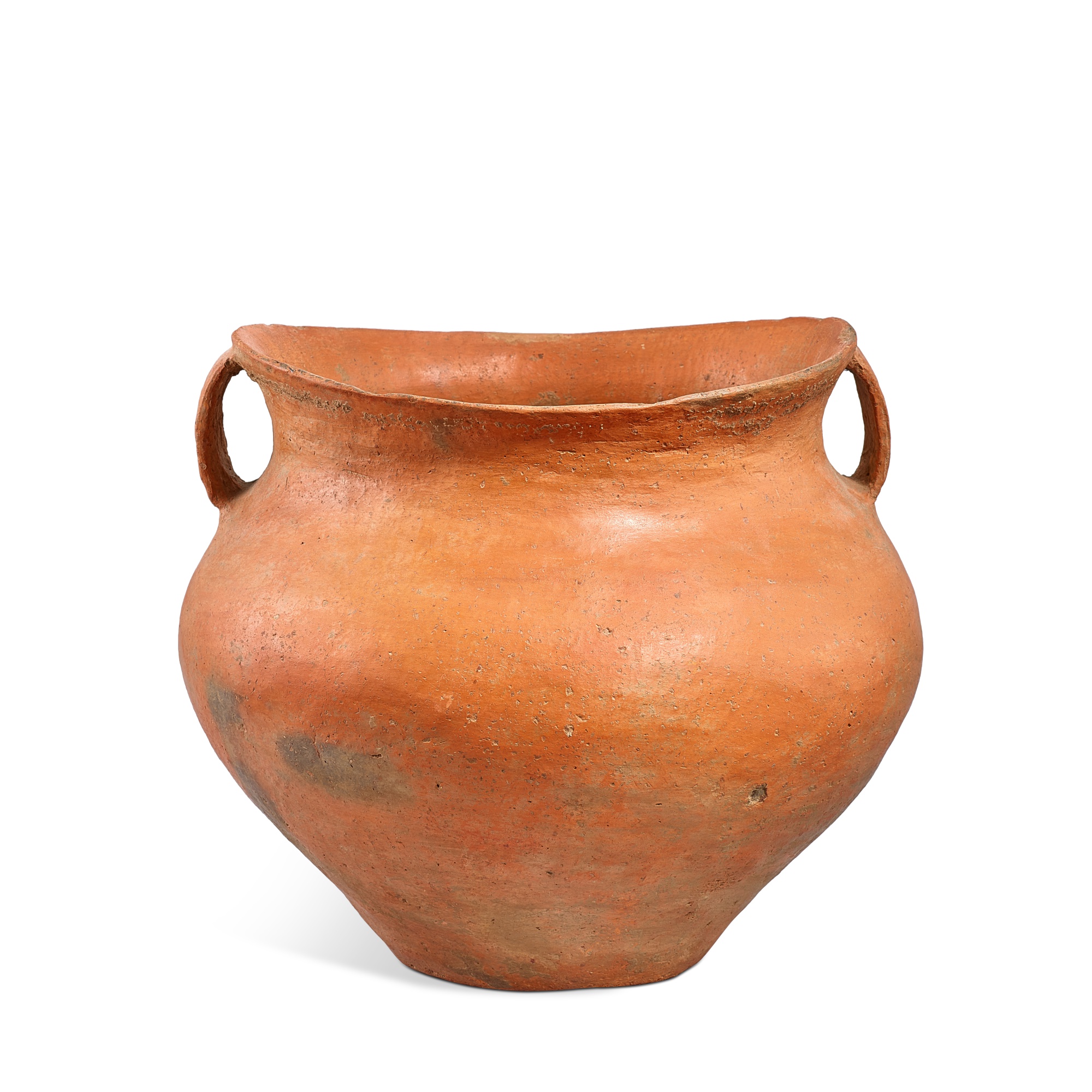 A large red pottery 'saddle-mouth' handled jar, Siwa culture, c. 1350 ...