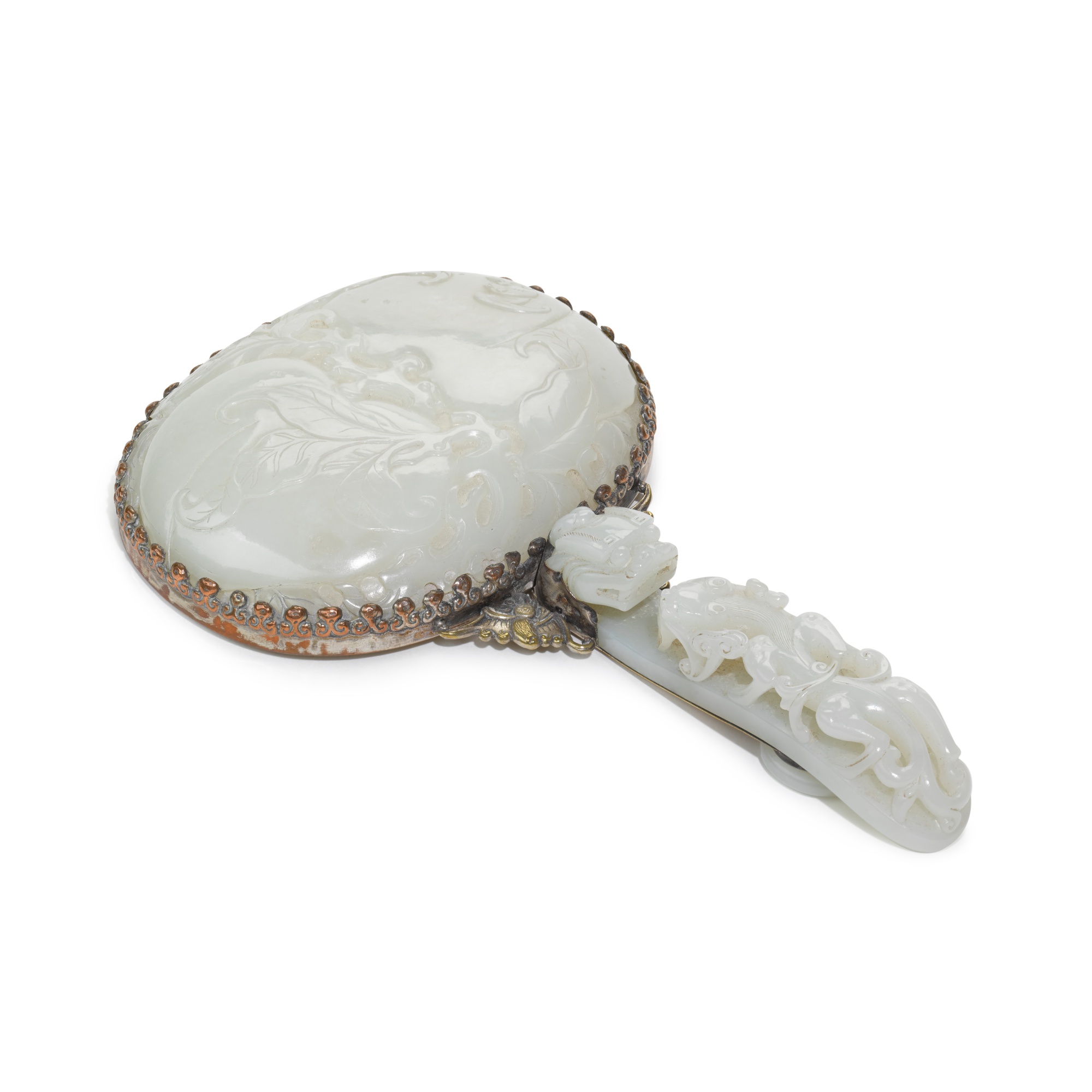 A pale celadon jade-embellished hand mirror, Qing dynasty, 19th century ...