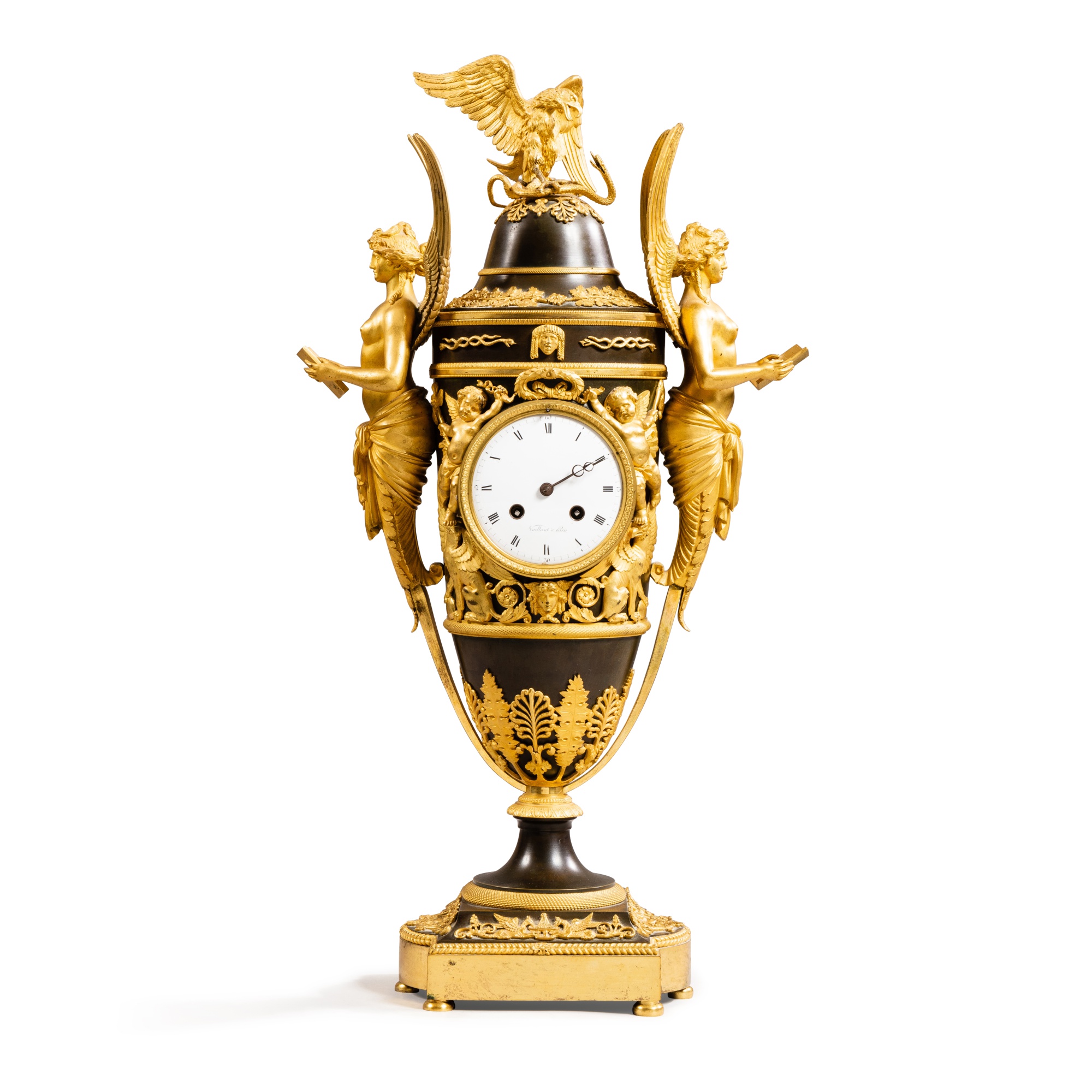 An Empire patined and gilt-bronze mantel clock, the mounts attributed ...