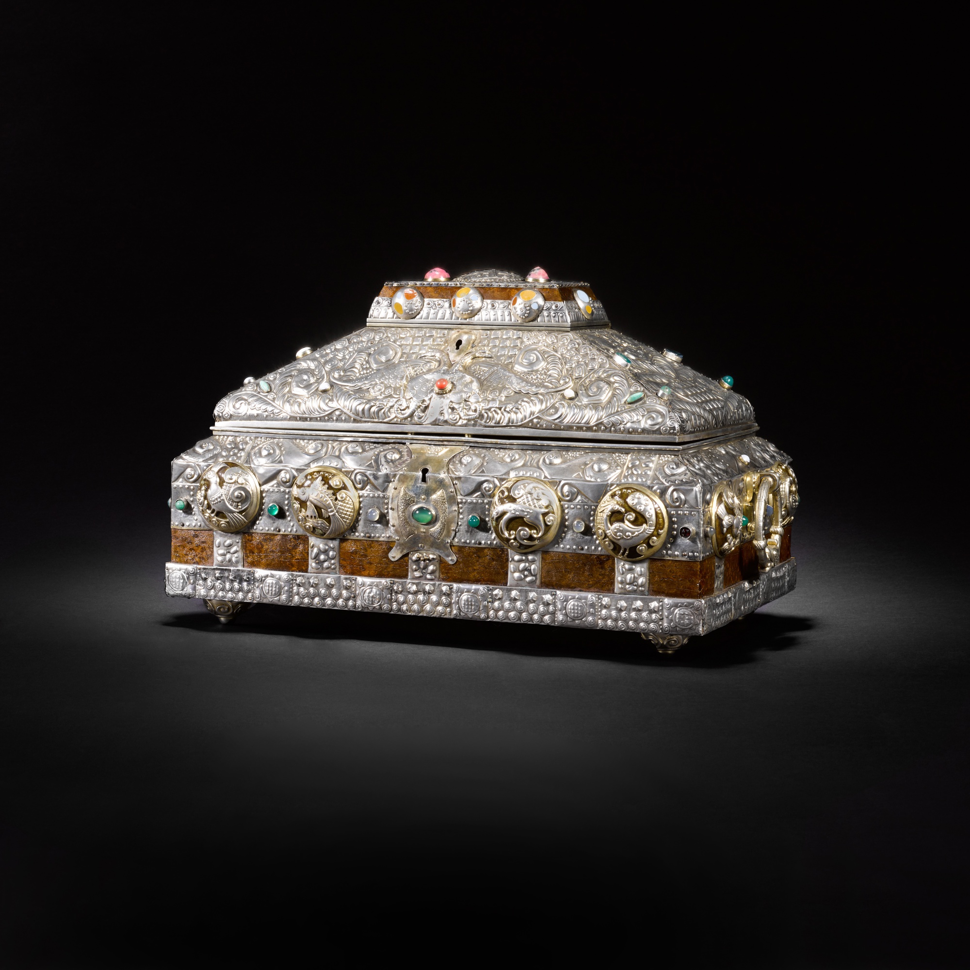 An impressive and large gem-set silver-mounted and enamel bird's-eye ...