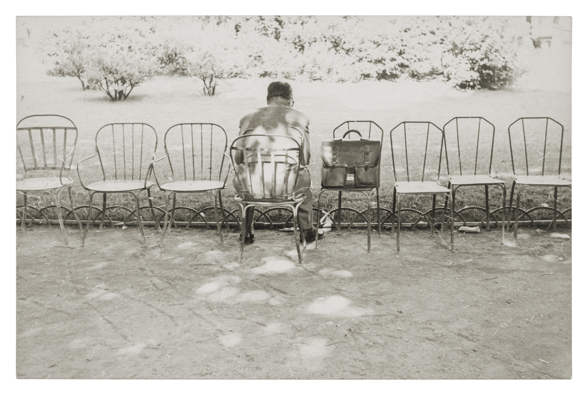 Paris (Man Seated In Park With Briefcase) | On the Road: Photographs by ...