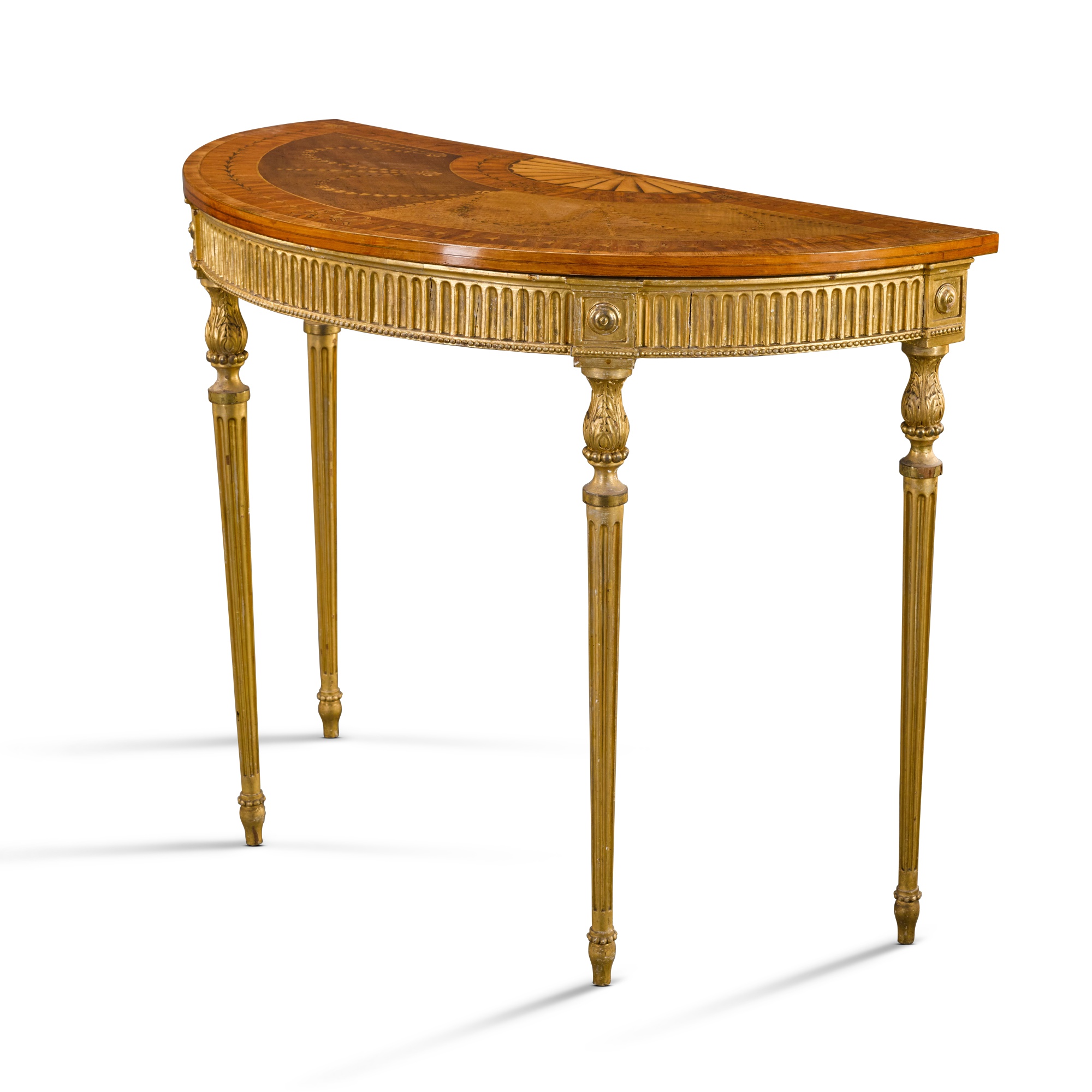 A pair of George III giltwood and marquetry demi-lune pier tables, circa 1775, in the manner of ...