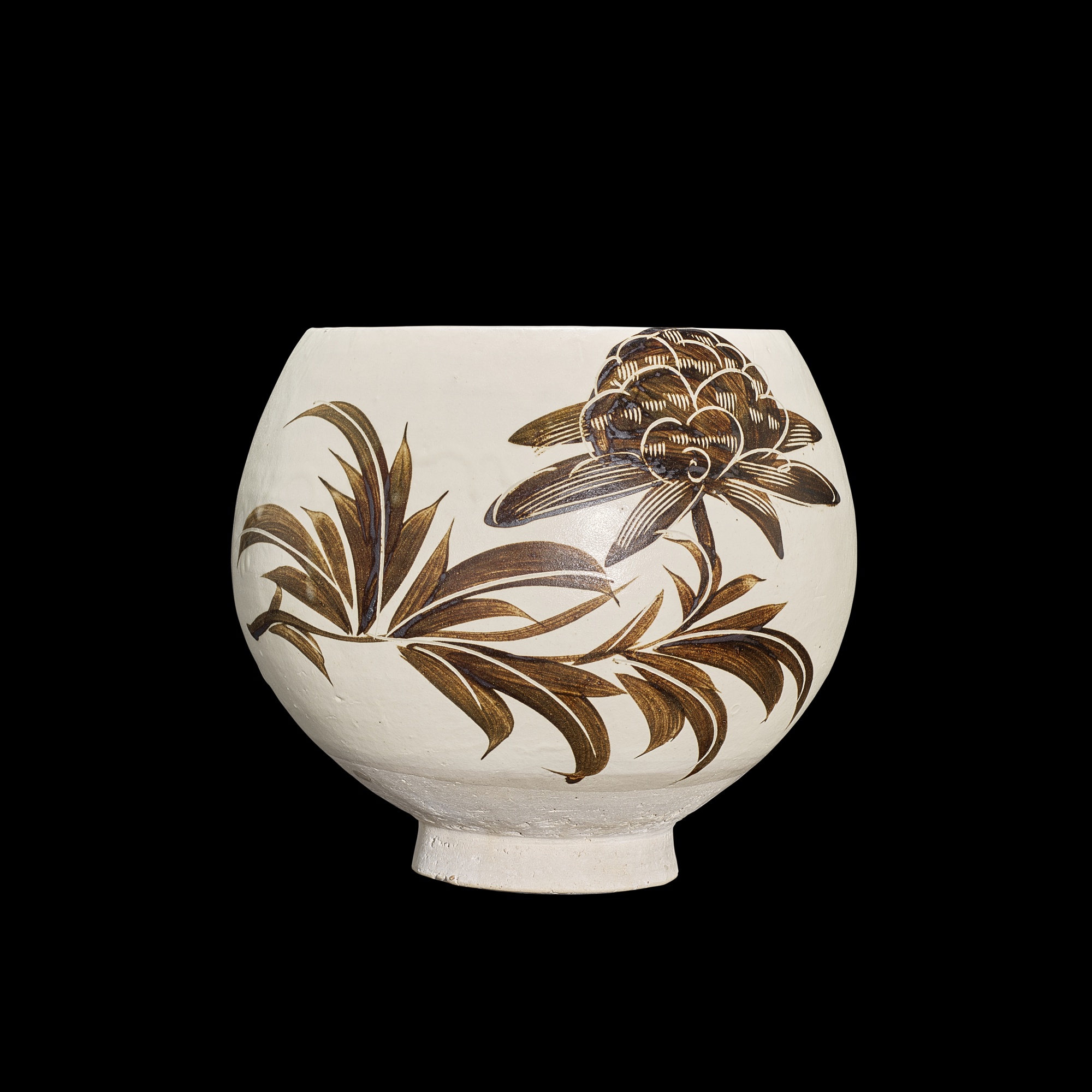 A large and superbly painted and incised Cizhou 'peony and butterfly ...