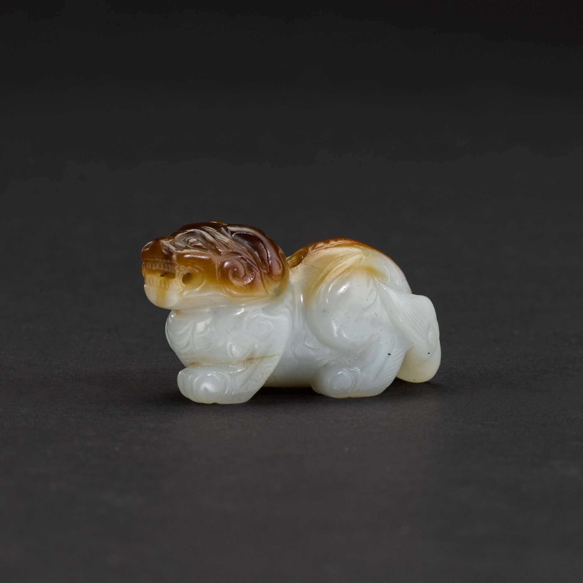 A white and brown jade chimera, Song-Ming dynasty | 宋至明 白玉辟邪 | HOTUNG ...