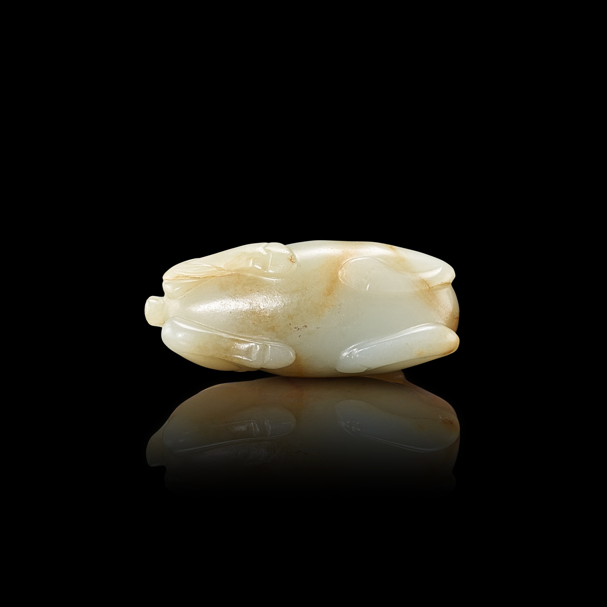 A white and russet jade 'ram and lingzhi' group, Ming dynasty or ...