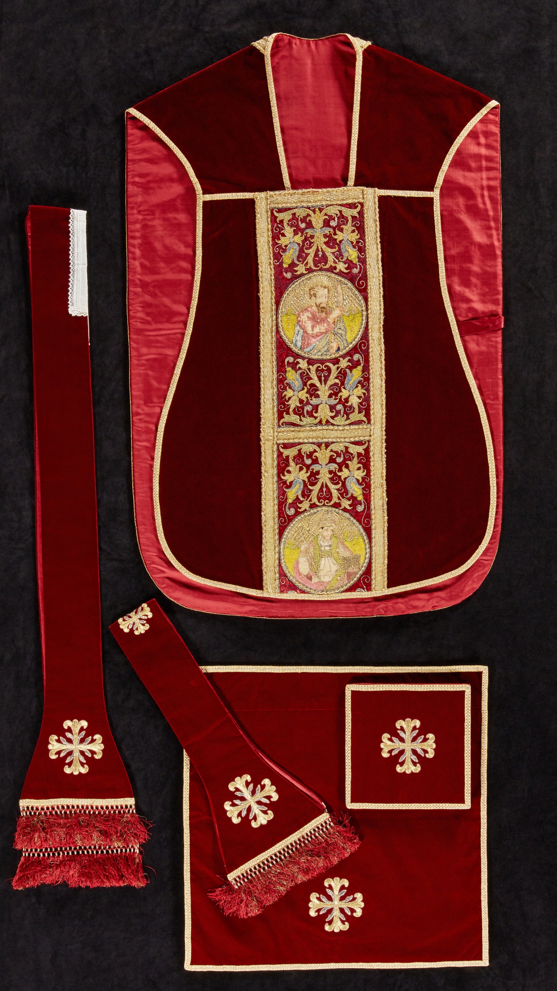 A claret, embroidered and metal-thread velvet chasuble with other ...