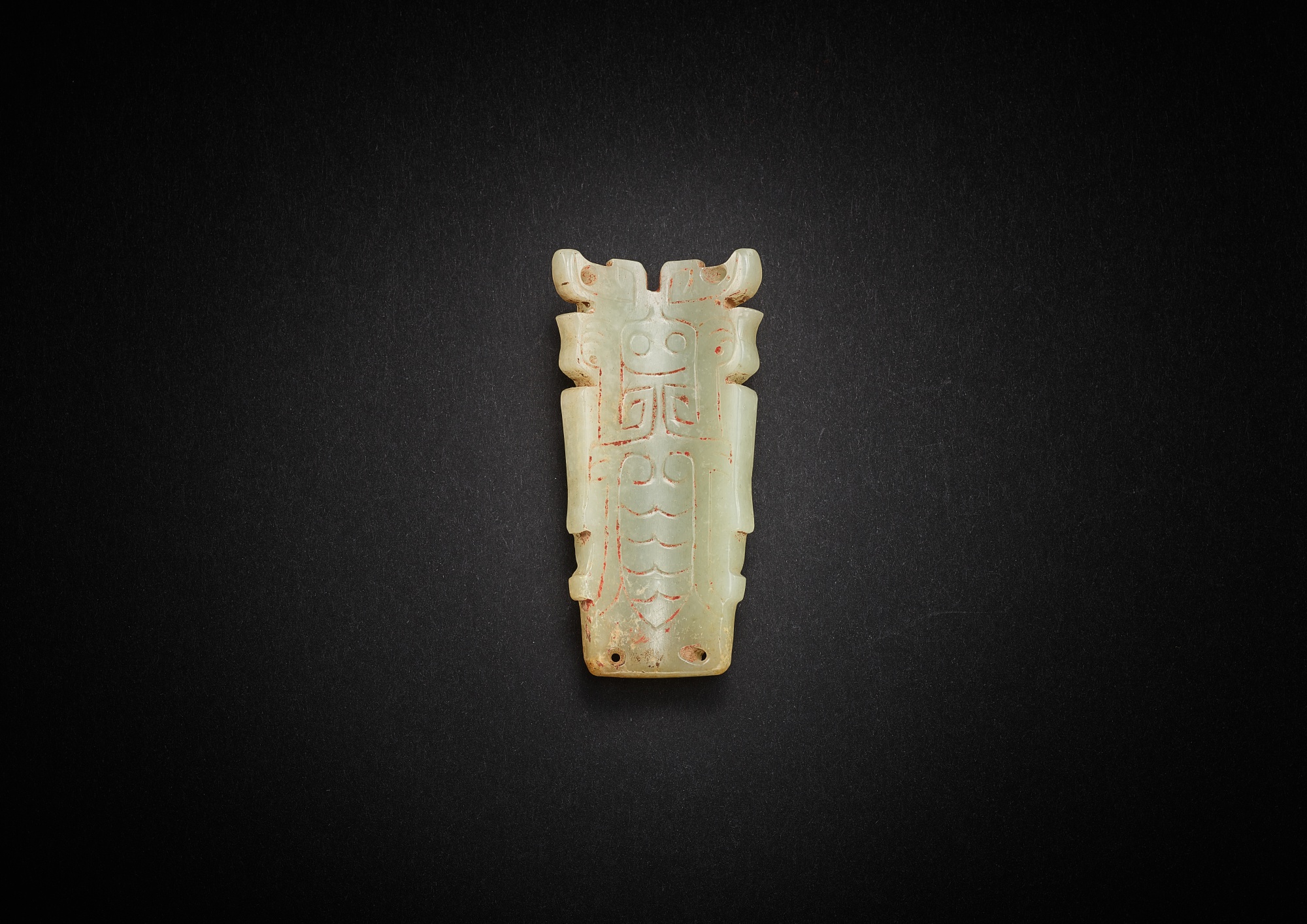 An extremely rare pale celadon jade 'kneeling human' ornament, Mid ...
