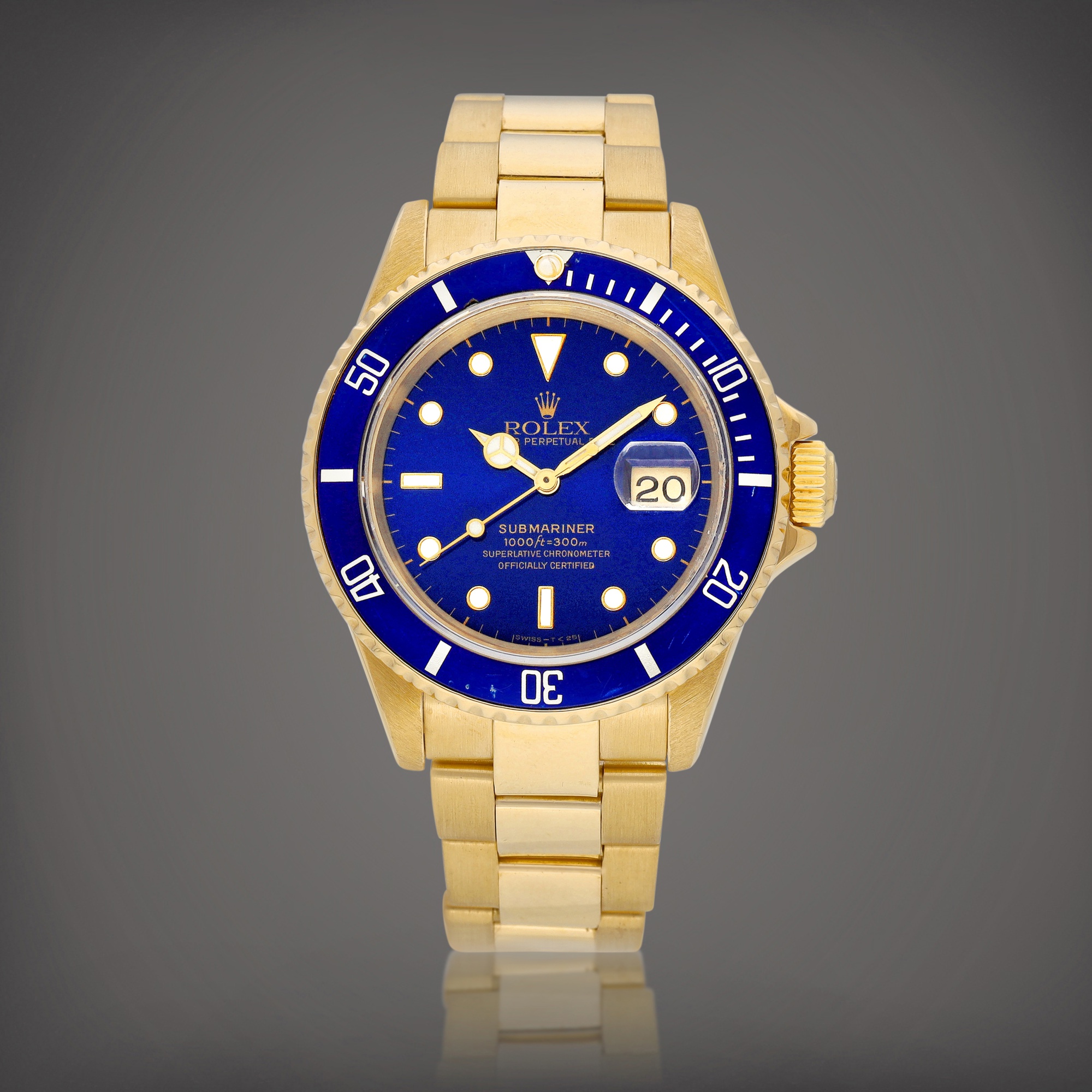 Submariner, Reference 16618 | A yellow gold wristwatch with date and ...