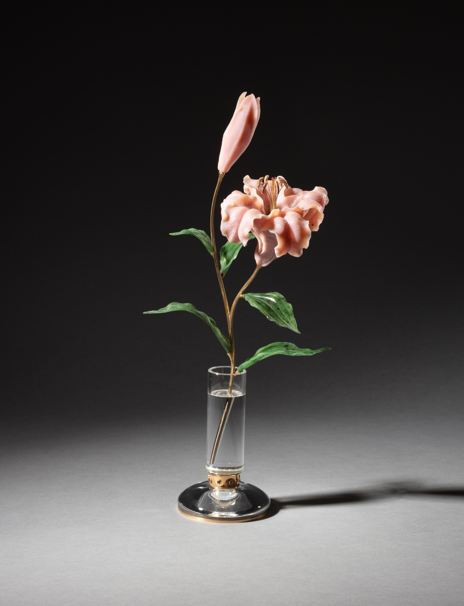 A pink opal, nephrite and rock crystal lily mounted in 18k gold, set ...