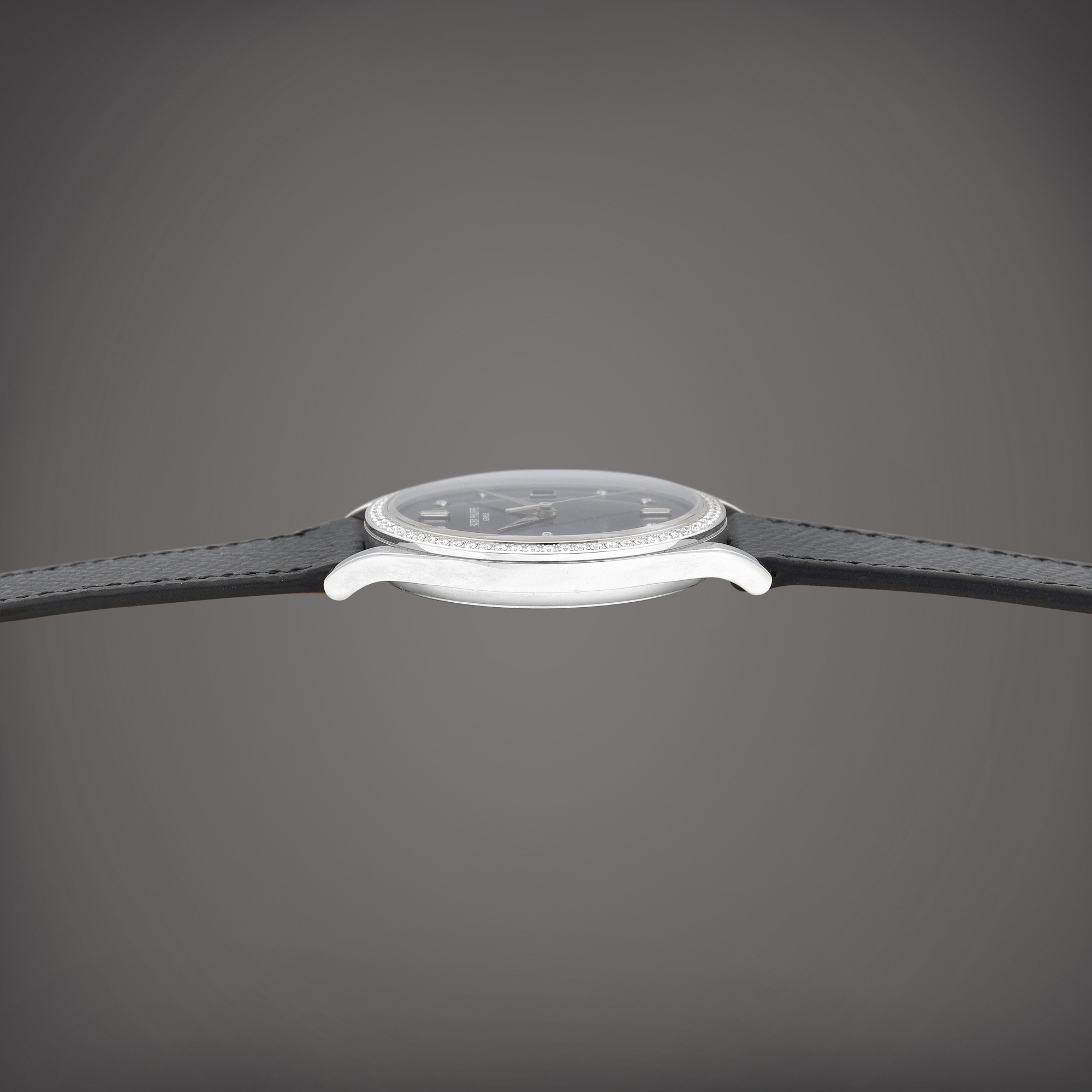 Reference 5297 | A white gold and diamond-set wristwatch with date ...