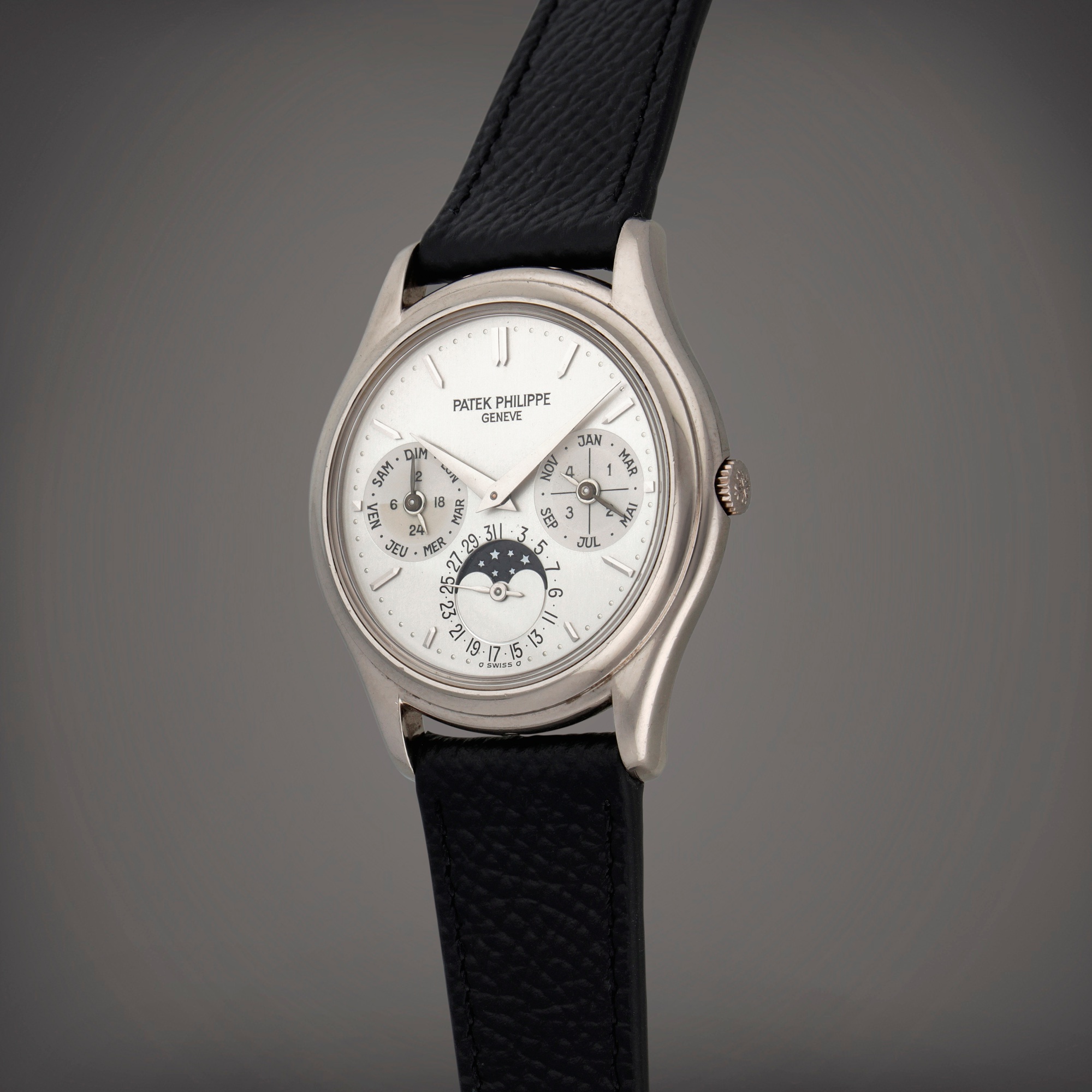 Reference 3940G-017 A white gold perpetual calendar wristwatch with day ...