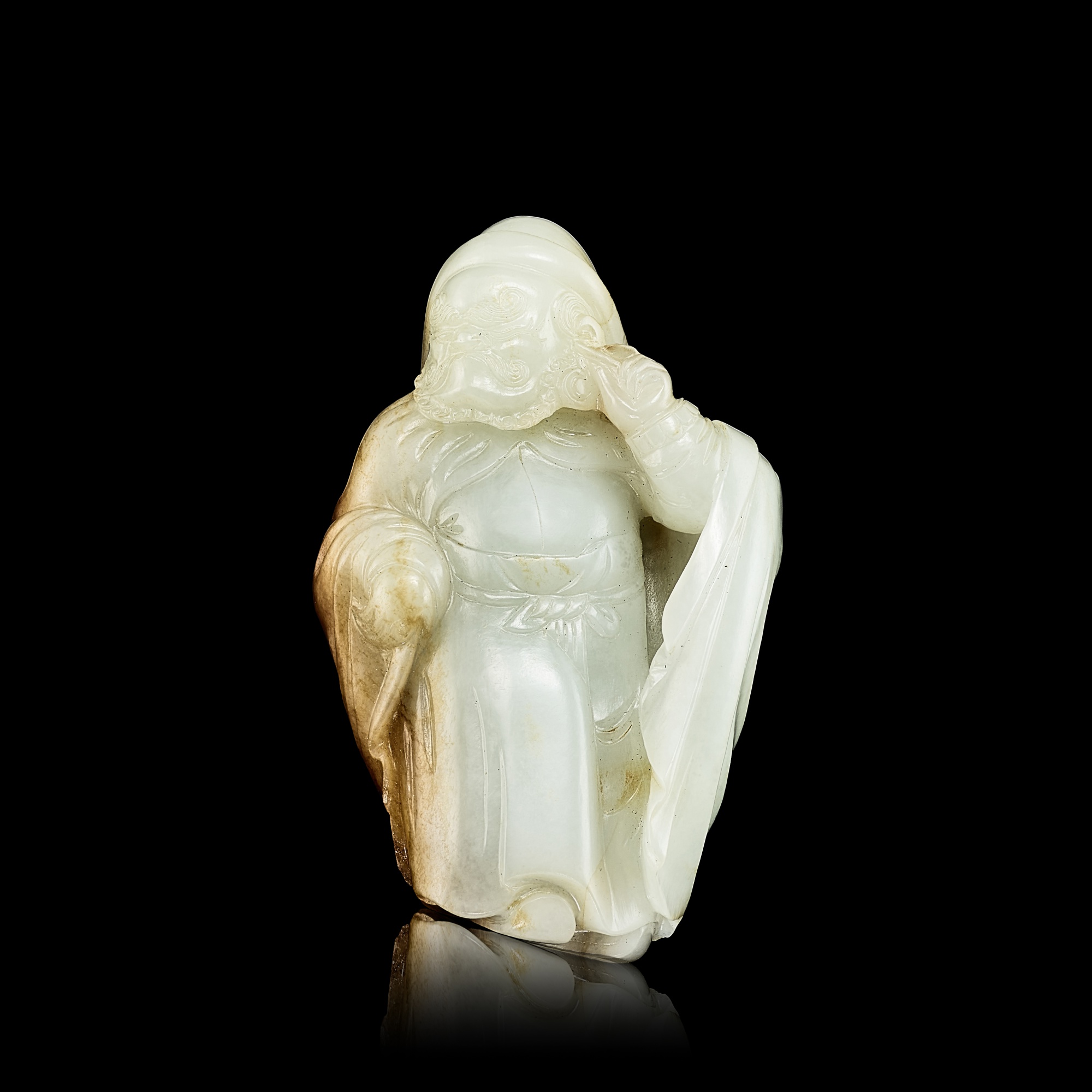 A white and russet jade figure of a foreigner, Qing dynasty, 18th ...