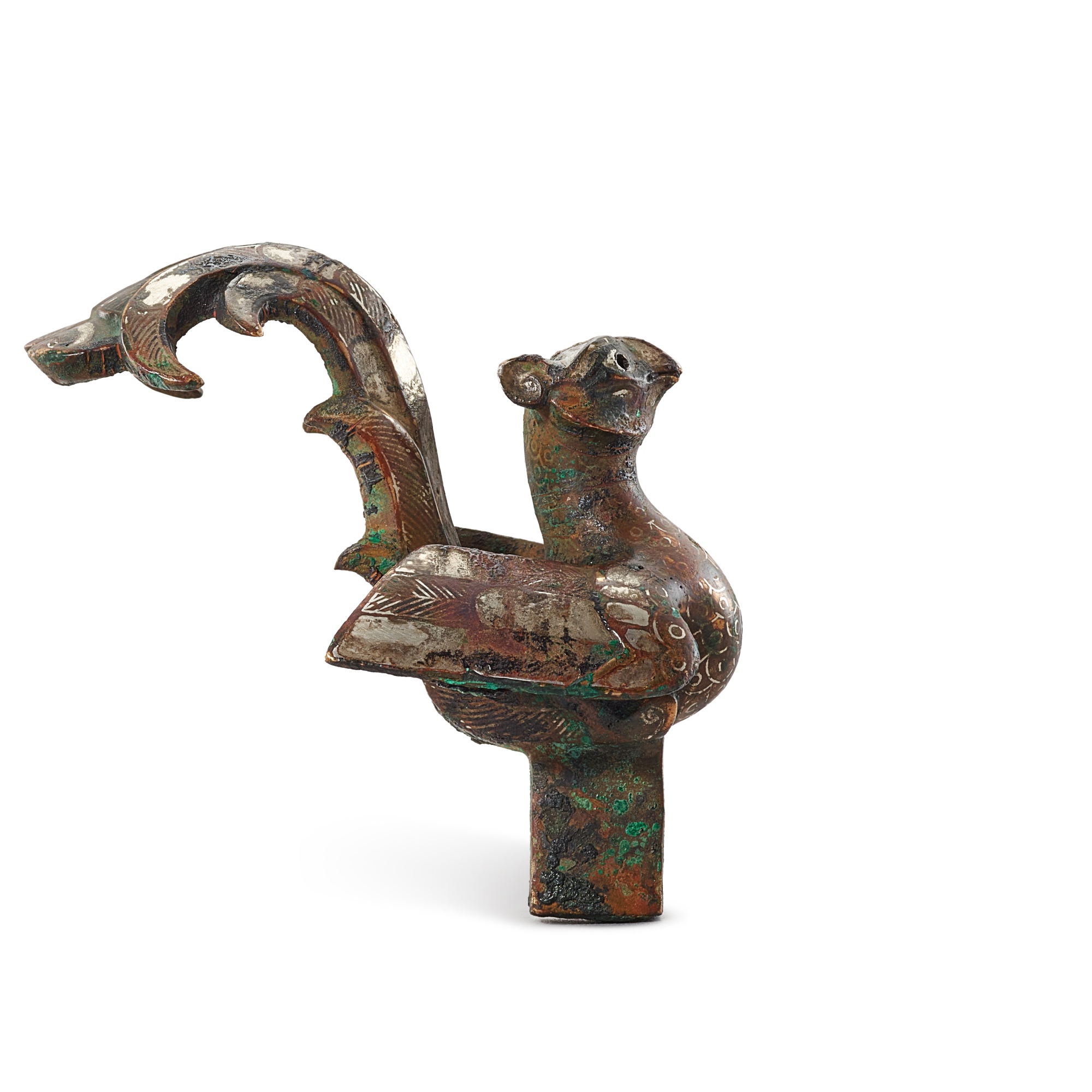 A silver-inlaid bronze 'bird' staff finial, Eastern Zhou dynasty 東周 ...