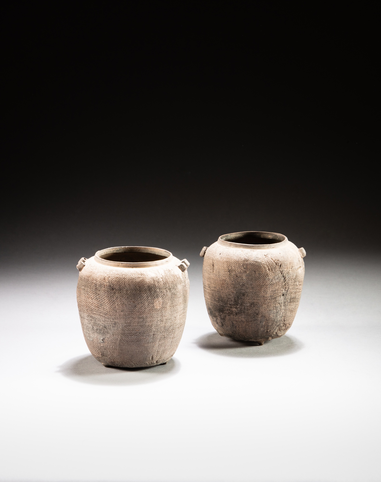 A pair of small grey pottery handled jars, Eastern Zhou dynasty | 東周 ...
