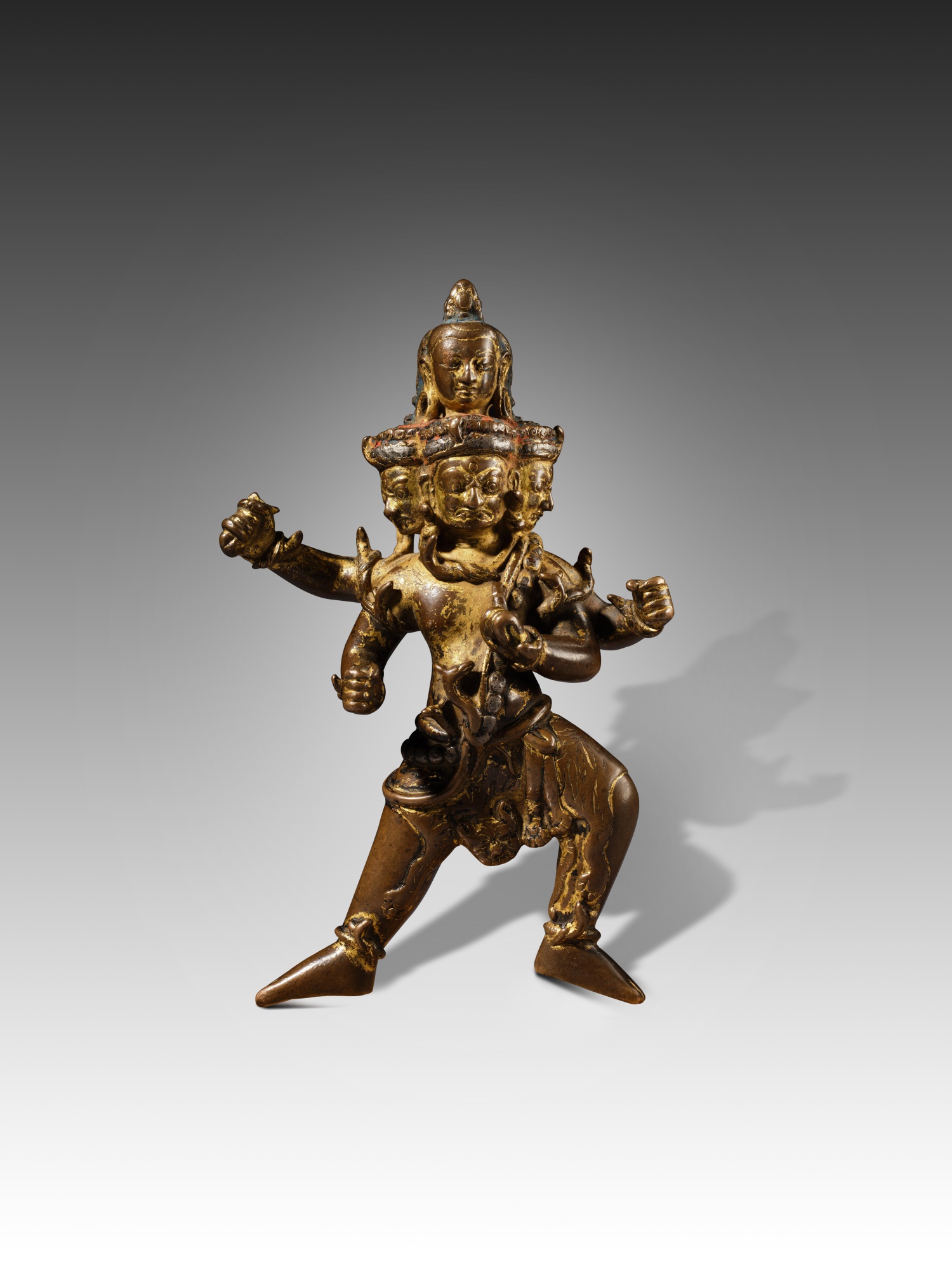 A silver-inlaid gilt-copper alloy figure of Krishna Yamari, Tibet ...