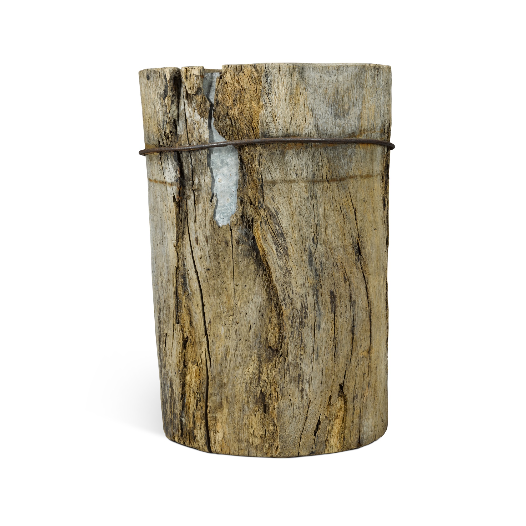 An unusual basin or dry storage container formed from a section of ...