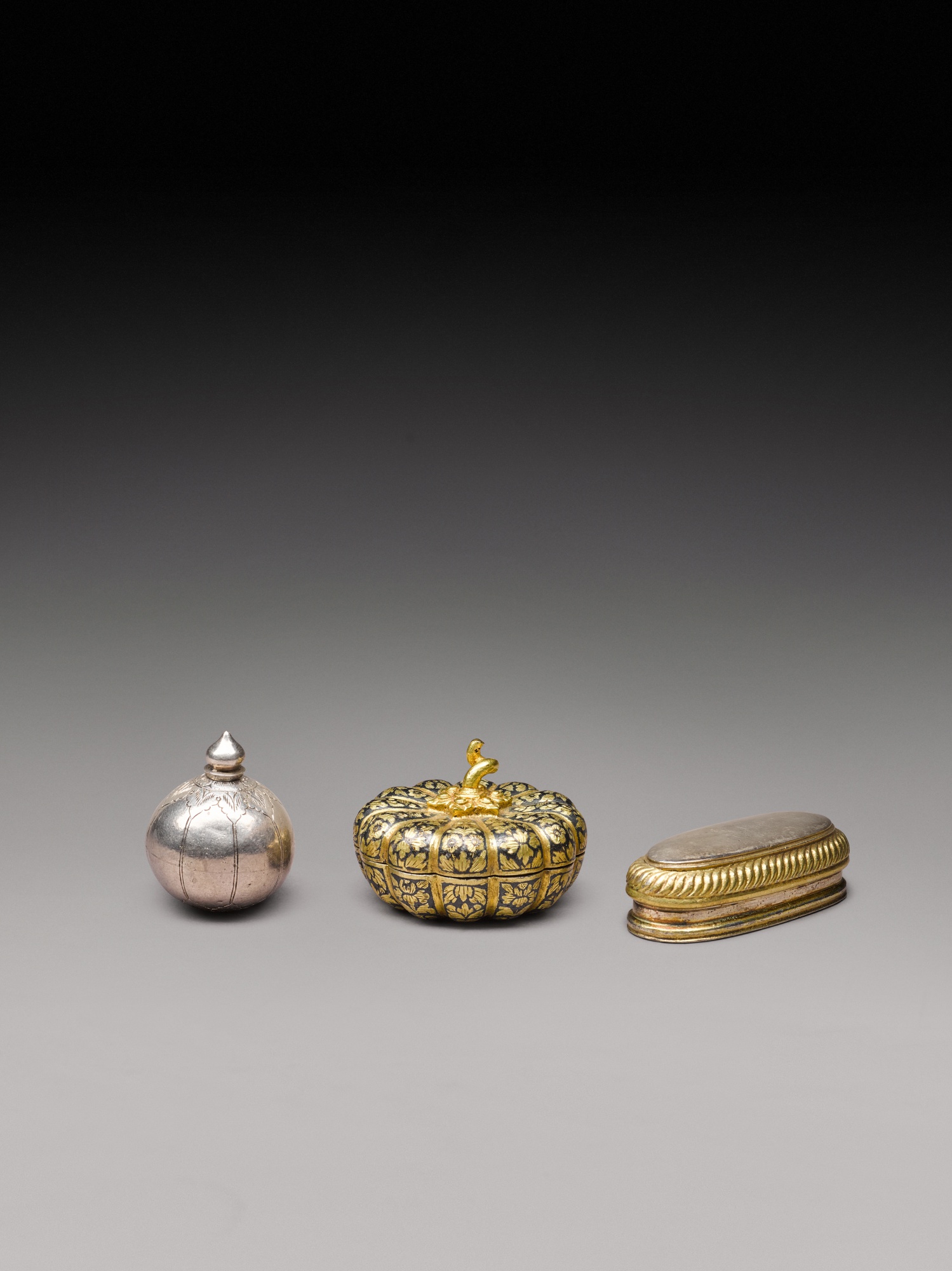 A silver scent bottle and two silver-gilt boxes, India, mid-17th ...