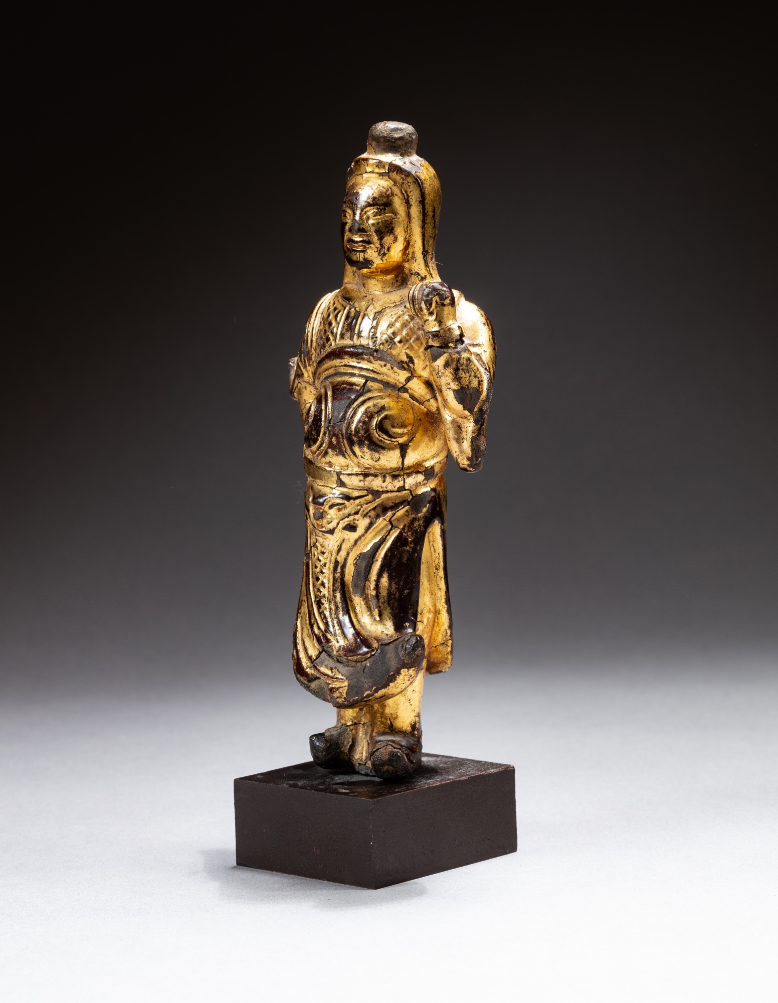 A small lacquer-gilt bronze guardian, Qing dynasty 17th-18th century ...