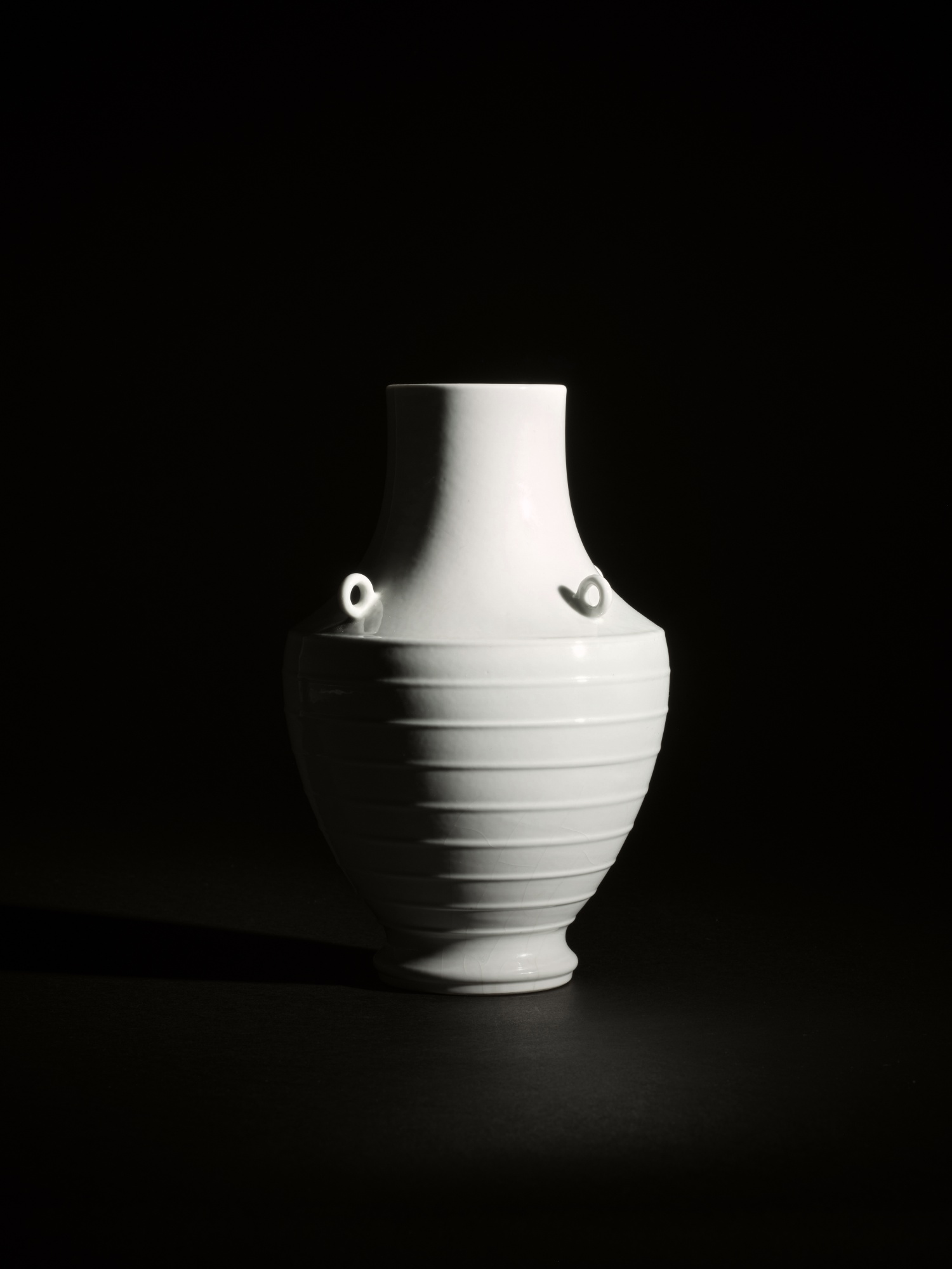 A fine and extremely rare archaistic white-glazed soft-paste vase, Seal ...